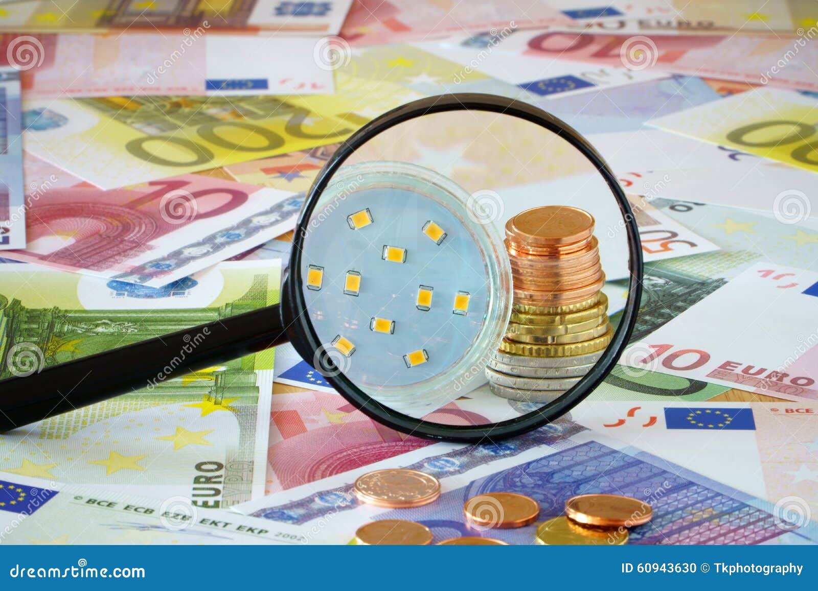Coin stack and LED Lamp stock photo. Image of coin, costs - 60943630