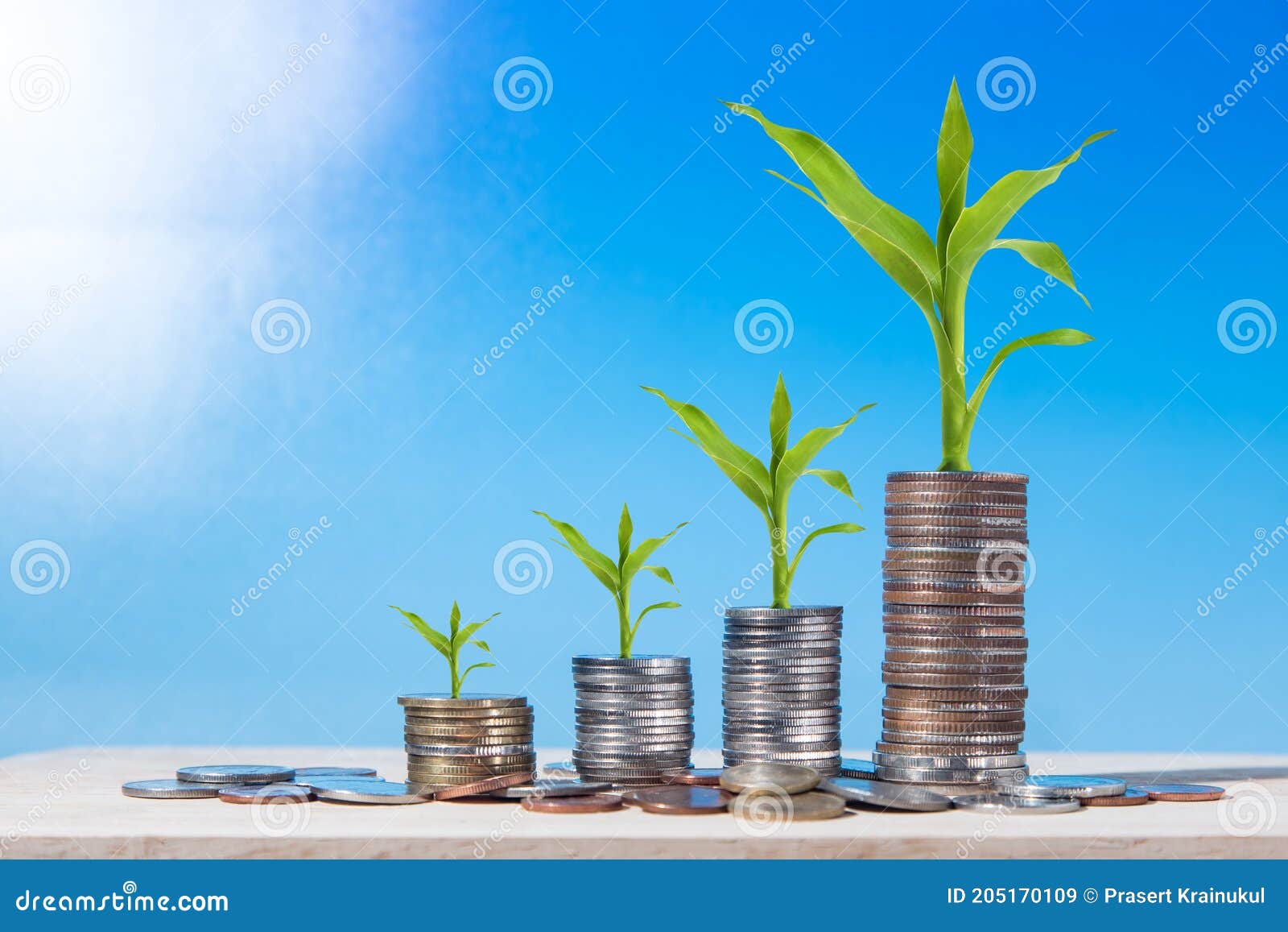Coin Stacks with a Blue Sky Background Stock Image - Image of currency ...