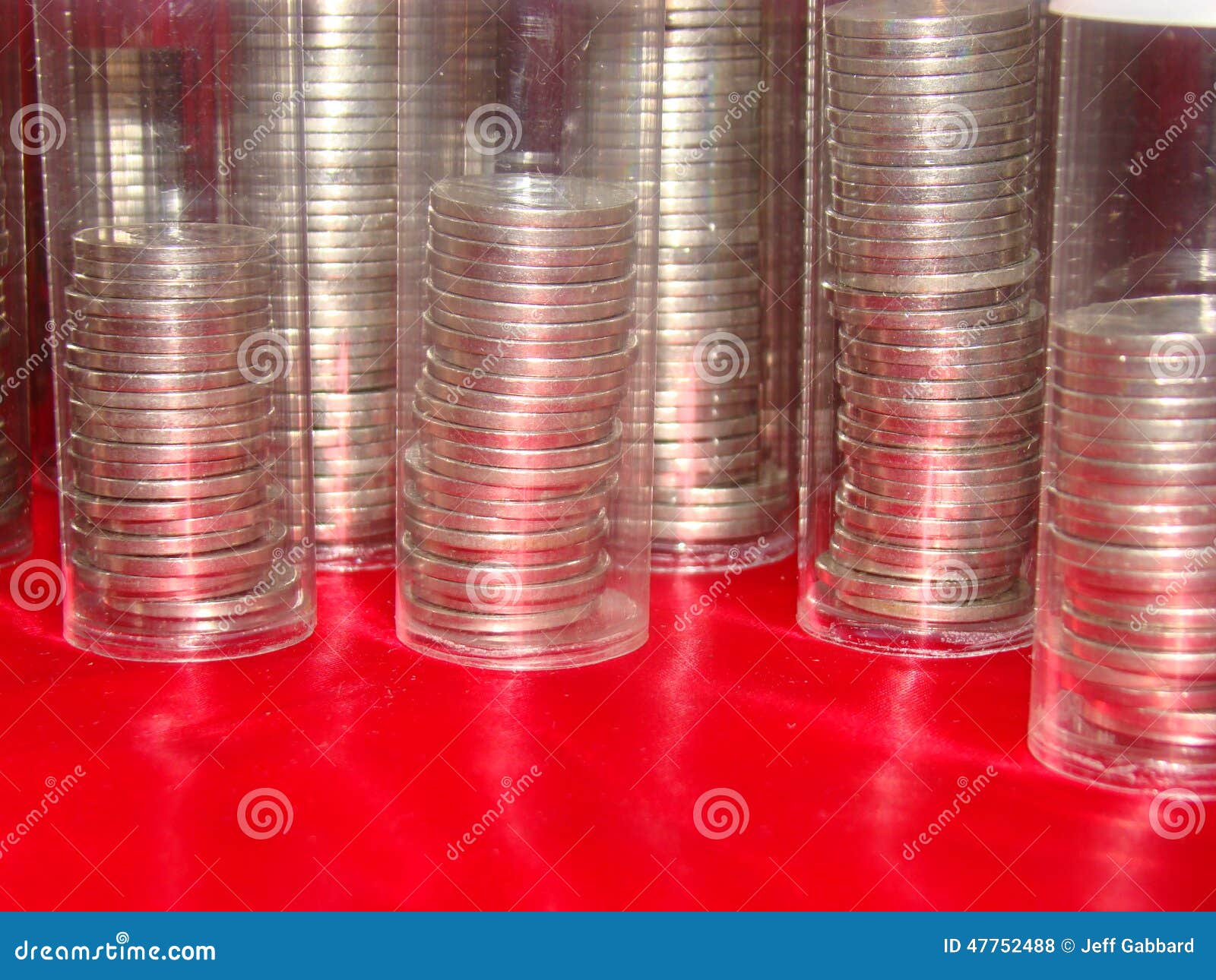 Coin stacks in clear tubes stock photo. Image of earn - 47752488