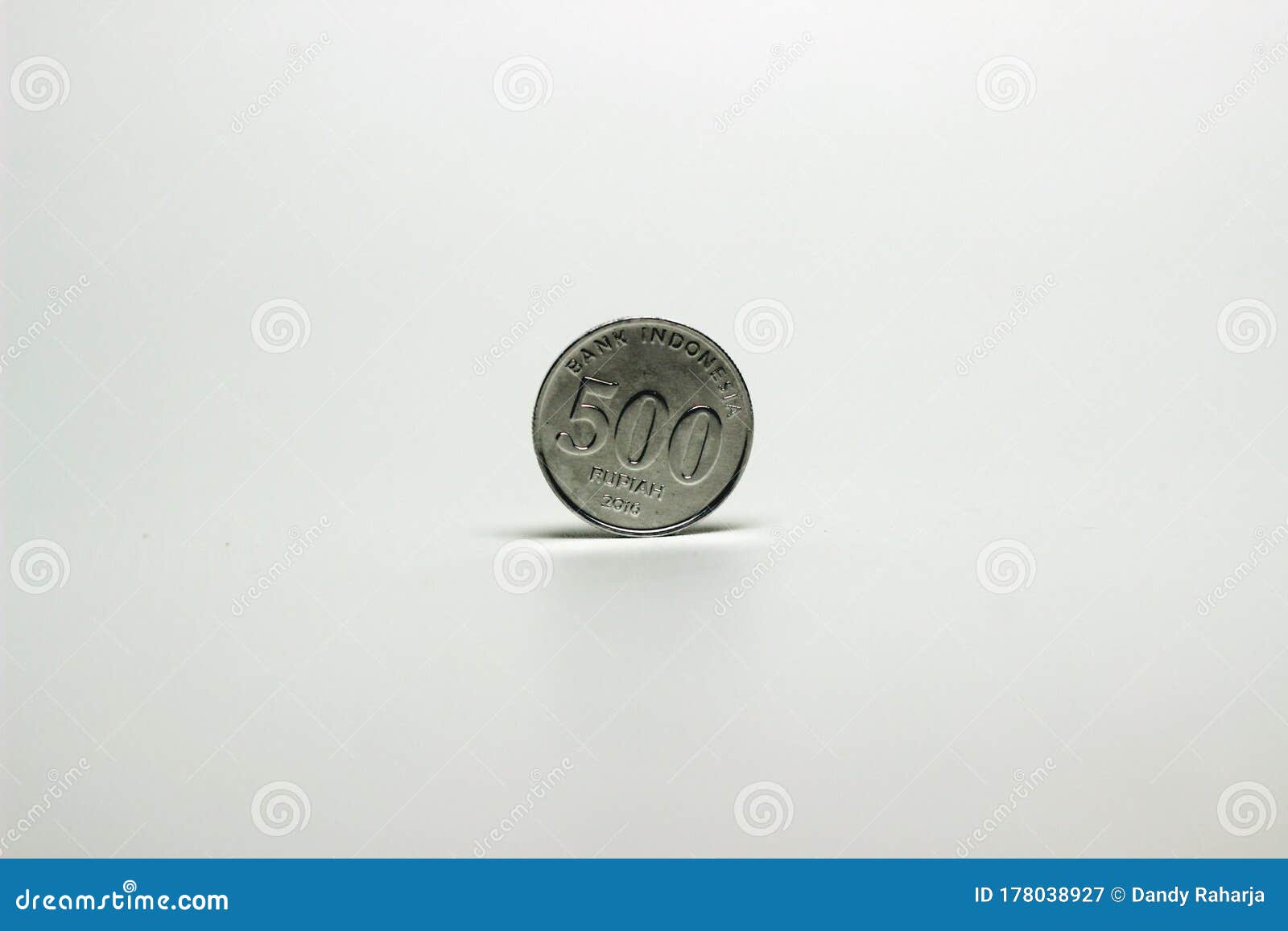 Coin Standing in the Front of White Background Stock Image - Image of ...