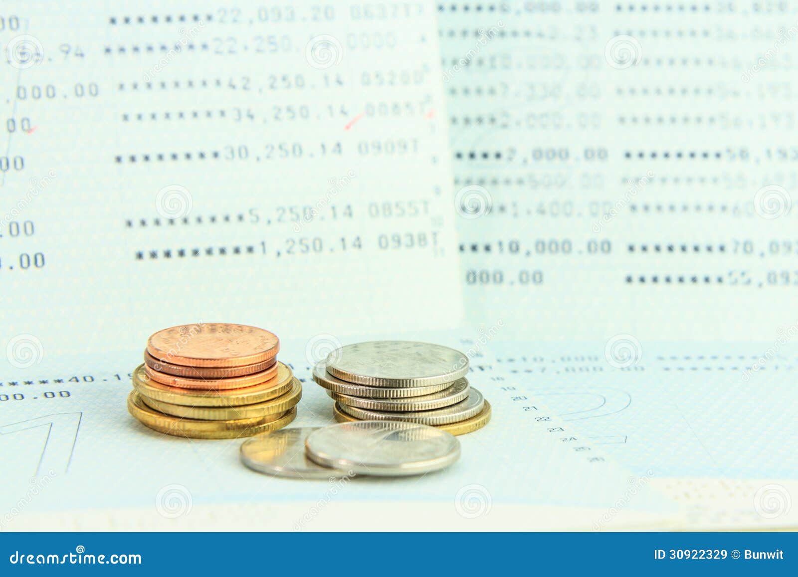 Coins on account passbook stock image. Image of management - 30922329