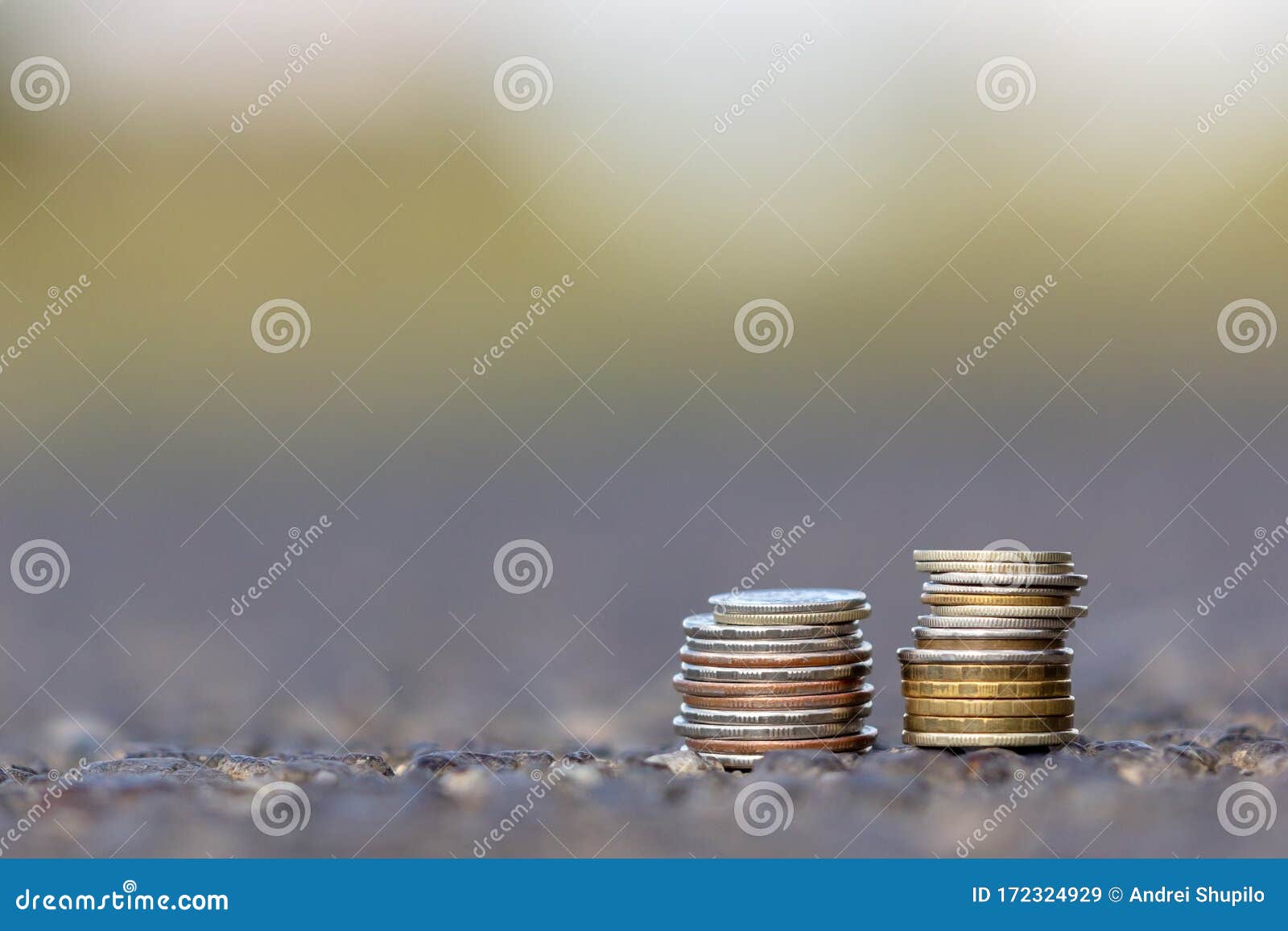 Coins on the asphalt road stock image. Image of pavement - 172324929