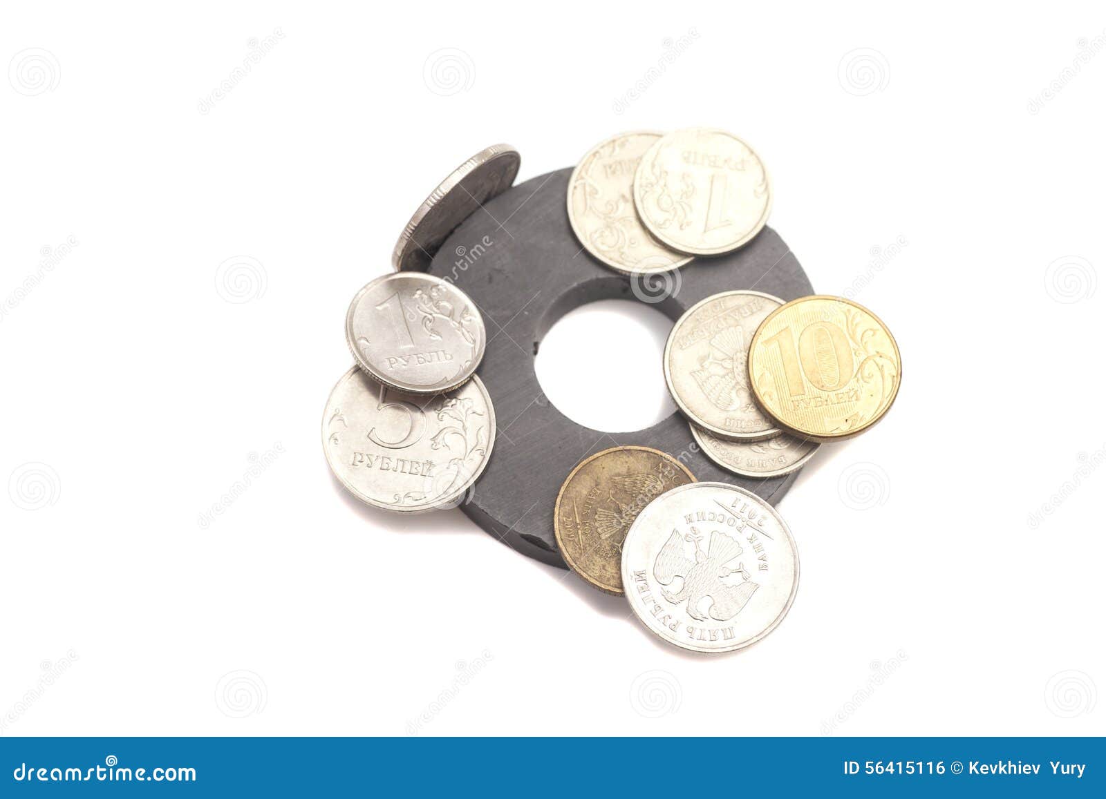 Coins attracted by magnet stock photo. Image of euro - 56415116