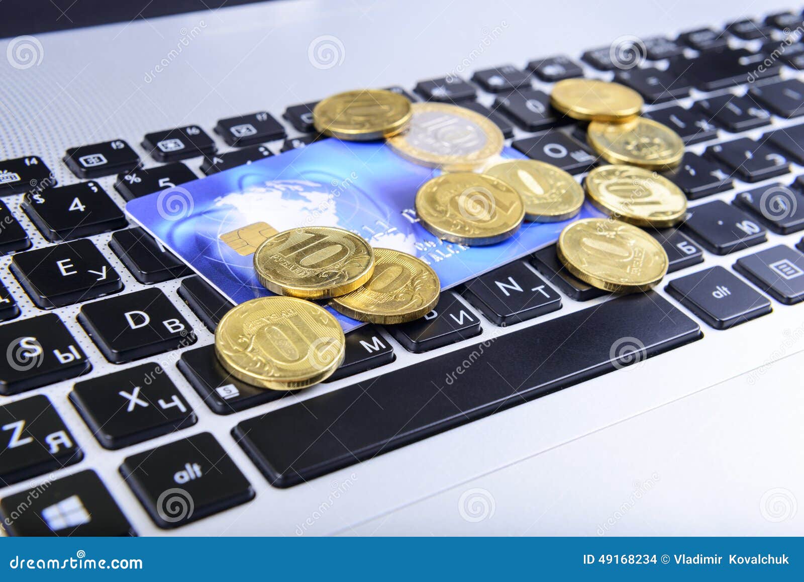 Coins and a Bank Card on the Keyboard Stock Photo - Image of profit ...
