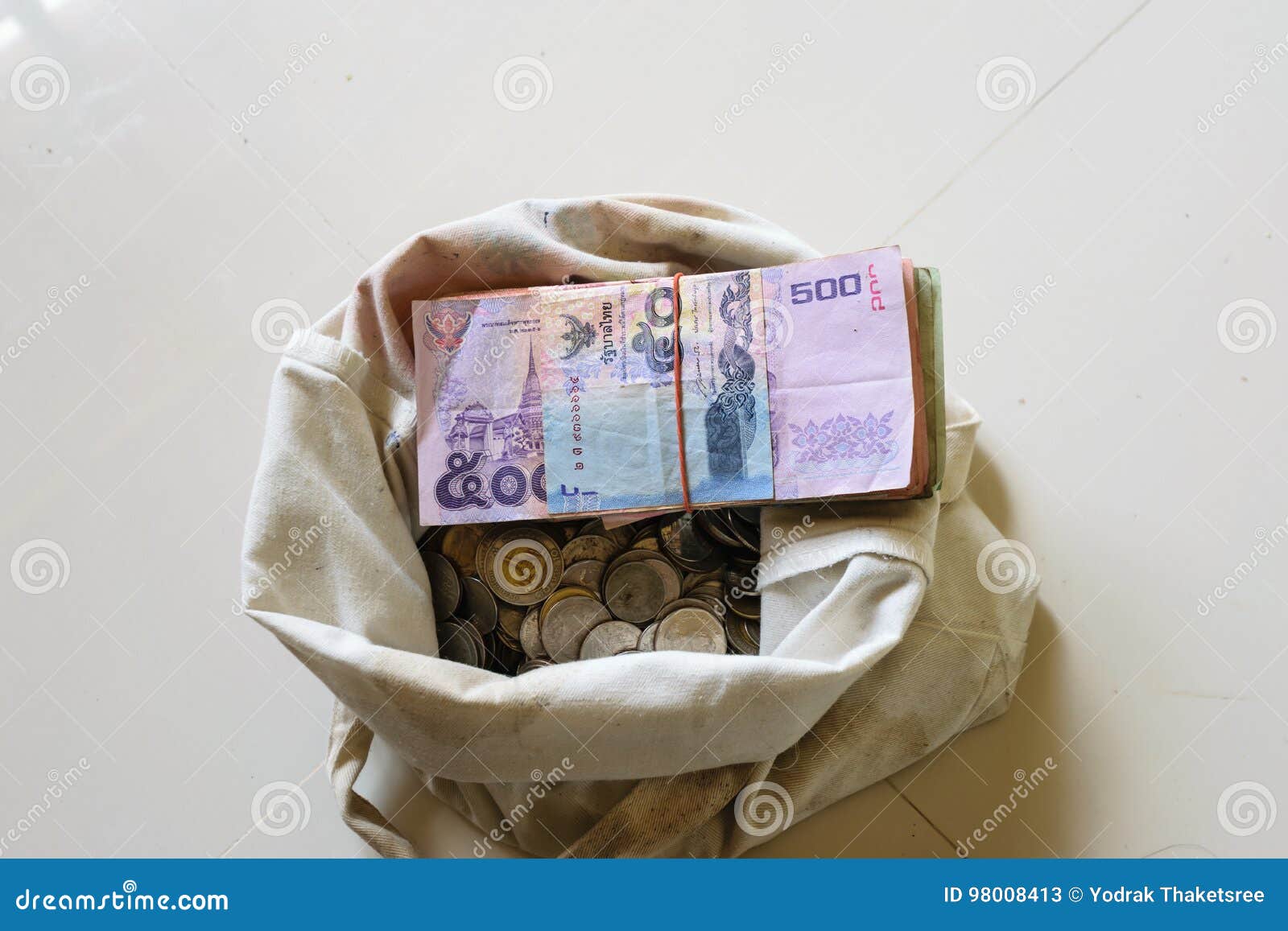 Coins and banknote in bag stock image. Image of finance - 98008413