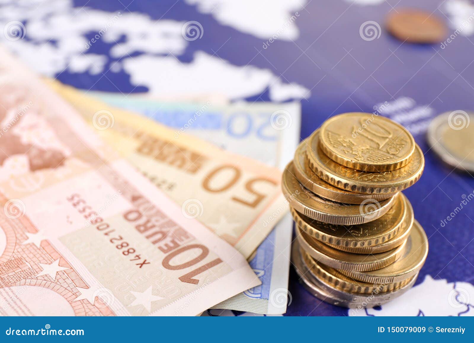 Coins and Banknotes on World Map, Closeup. Travel Concept Stock Image ...