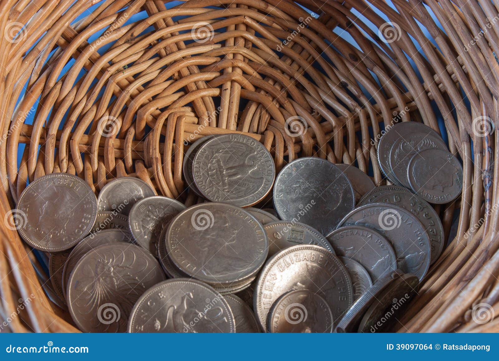 Coins in a basket stock photo. Image of isolated, circle - 39097064