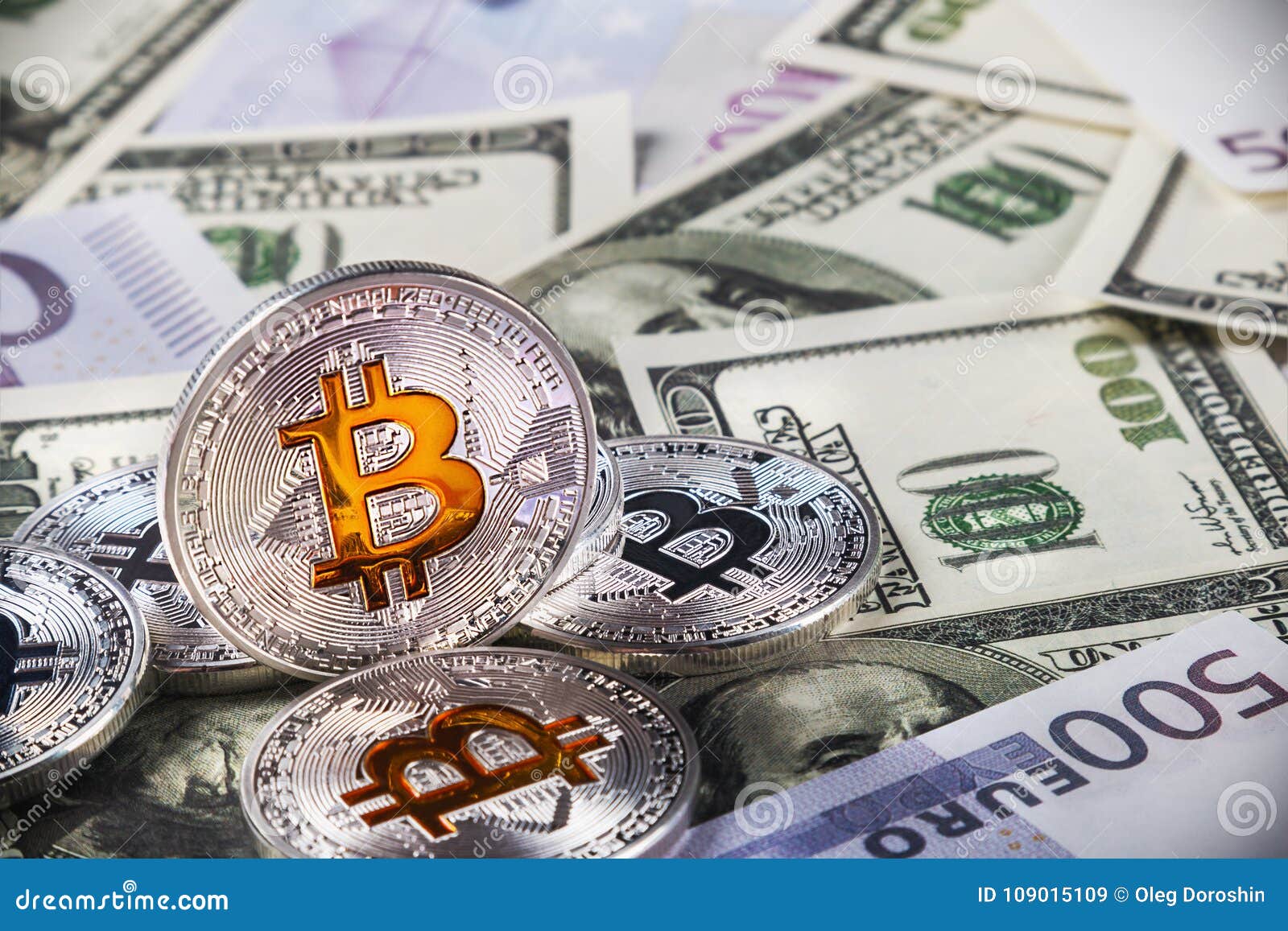 Coins of Bitcoin on the Background of Banknotes of Dollars and E Stock ...