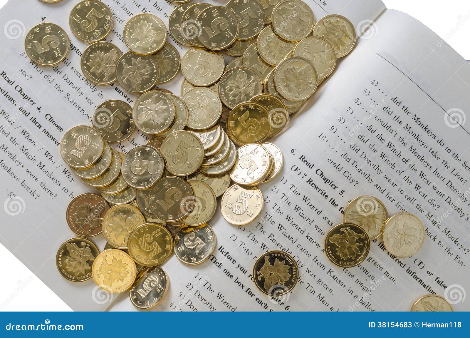 Coins and book stock image. Image of goldnickel, finance - 38154683