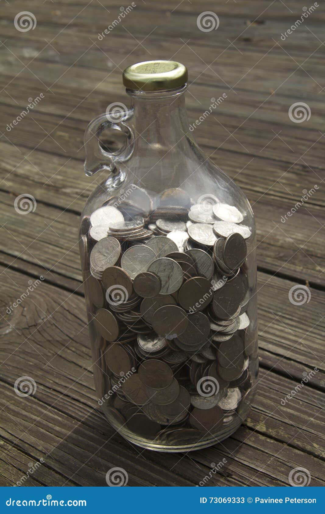 Coins in a bottle stock image. Image of bottle, money - 73069333