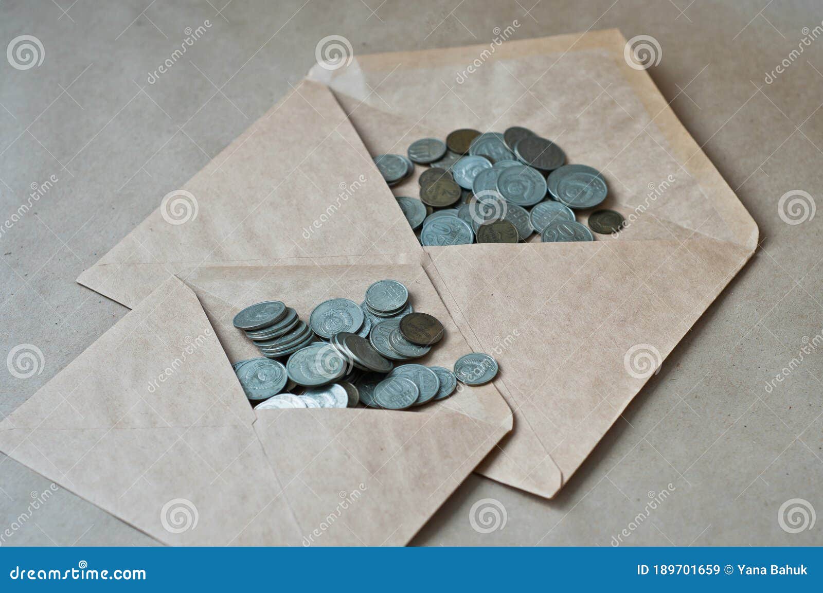Coins from the Brown Envelope Stock Image - Image of envelope, money ...