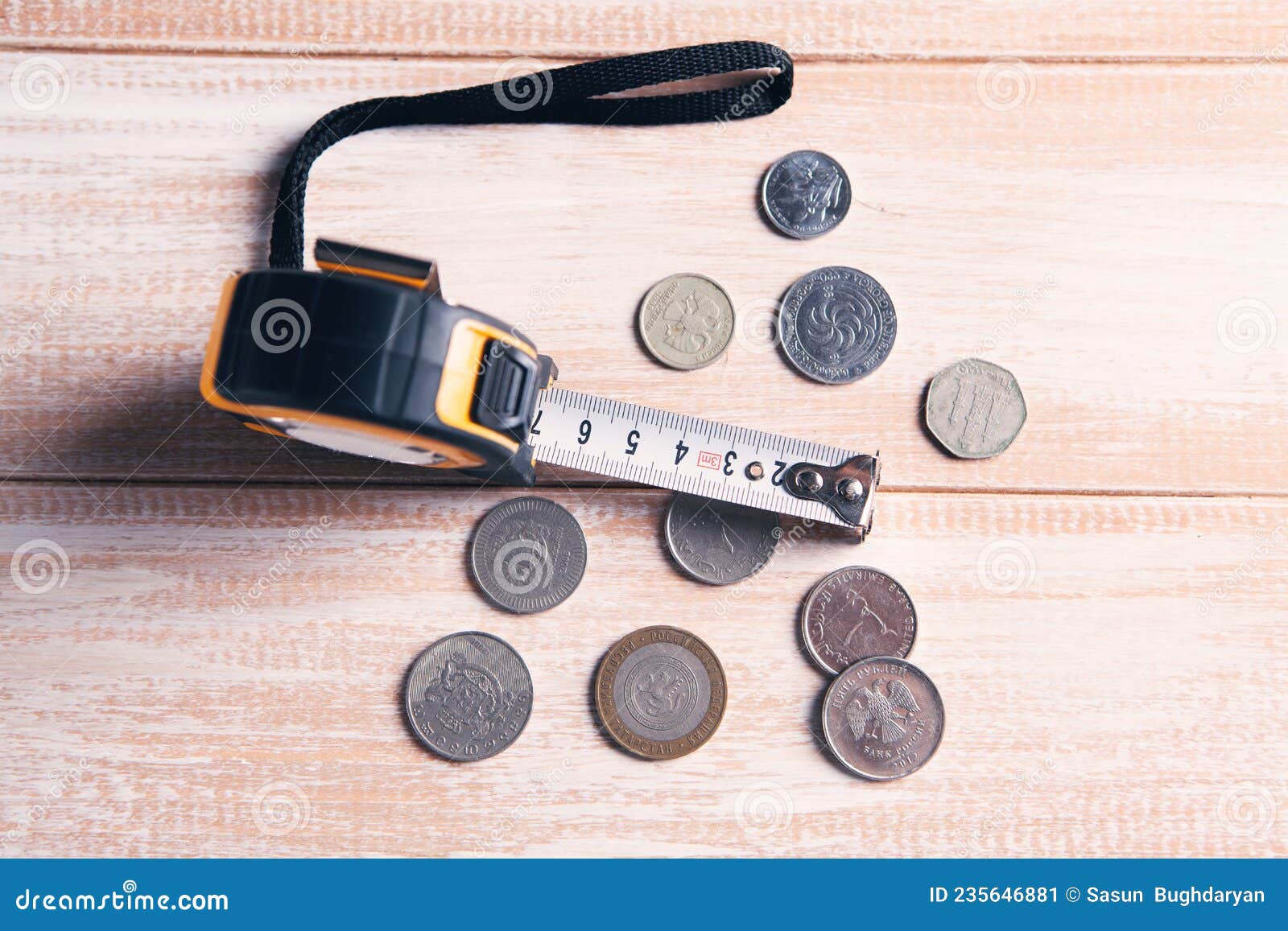 Coins and Building Meter on the Table Stock Image - Image of bills ...