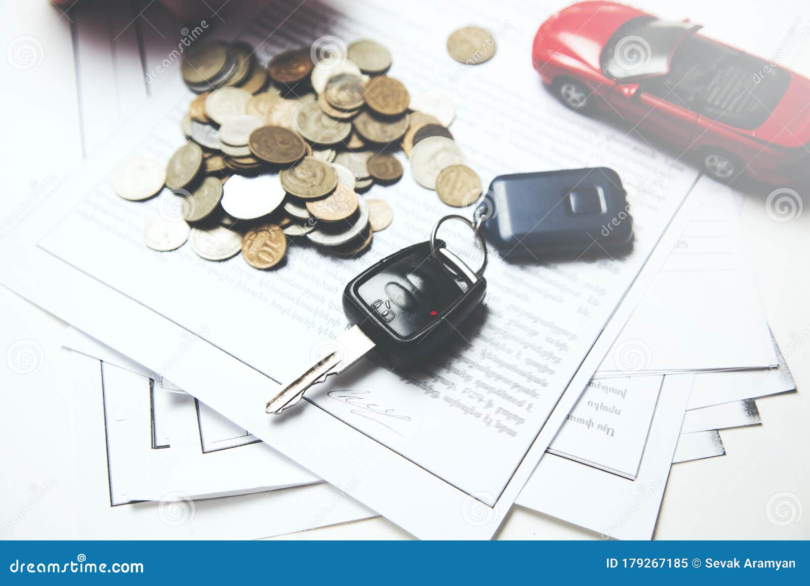 Coins with Car Model and Key on Document Stock Image - Image of ...