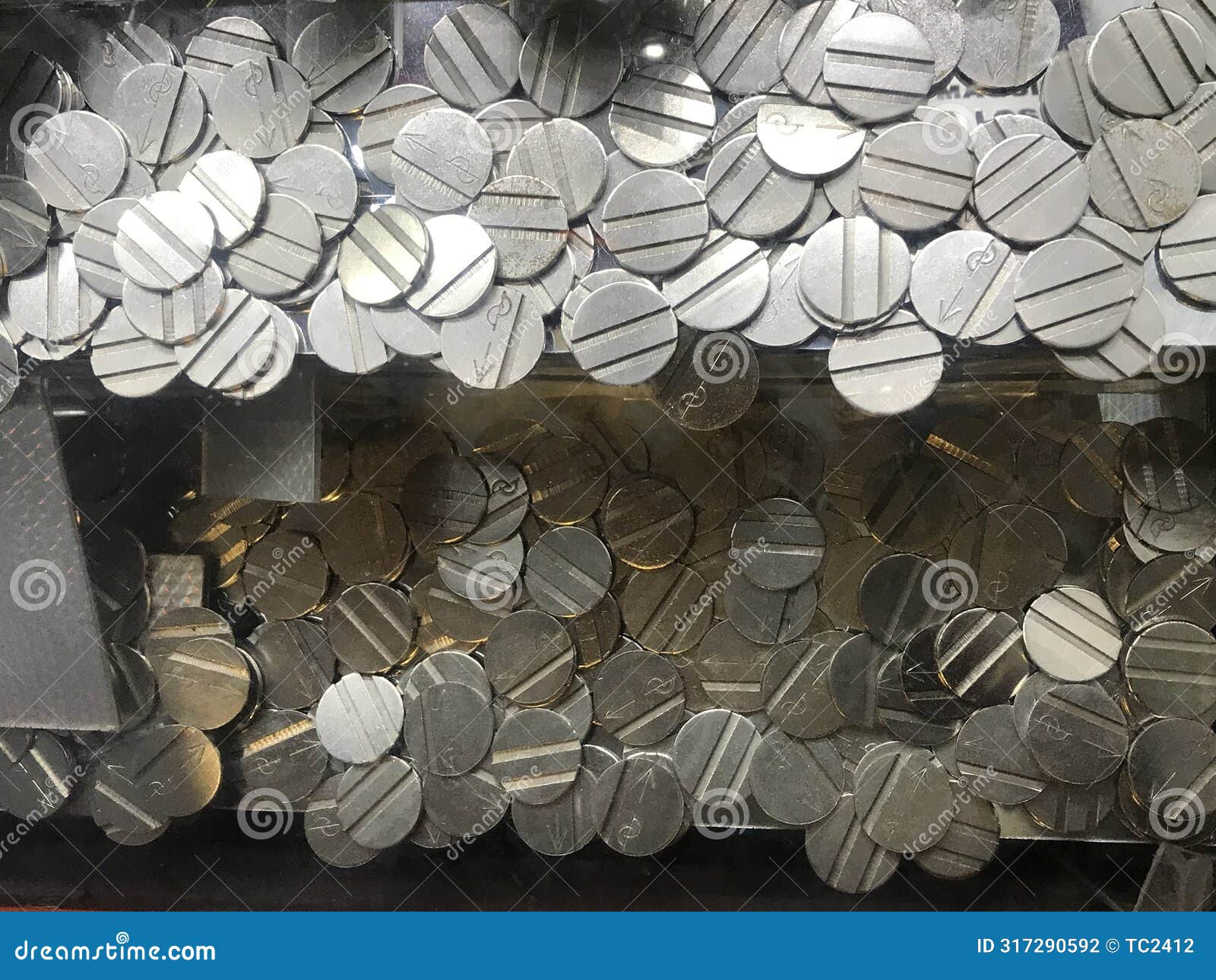 Coins from a Coin Cascade Machine. Stock Photo - Image of kingdom, fall ...