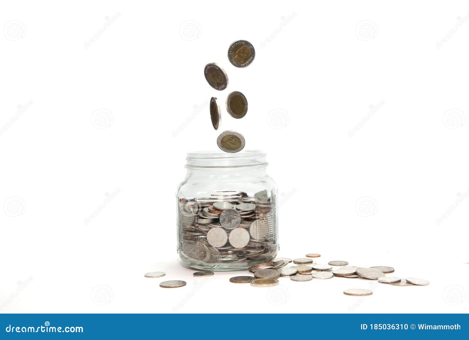 Coins Dropping into the Glass for Saving the Money Stock Photo - Image ...