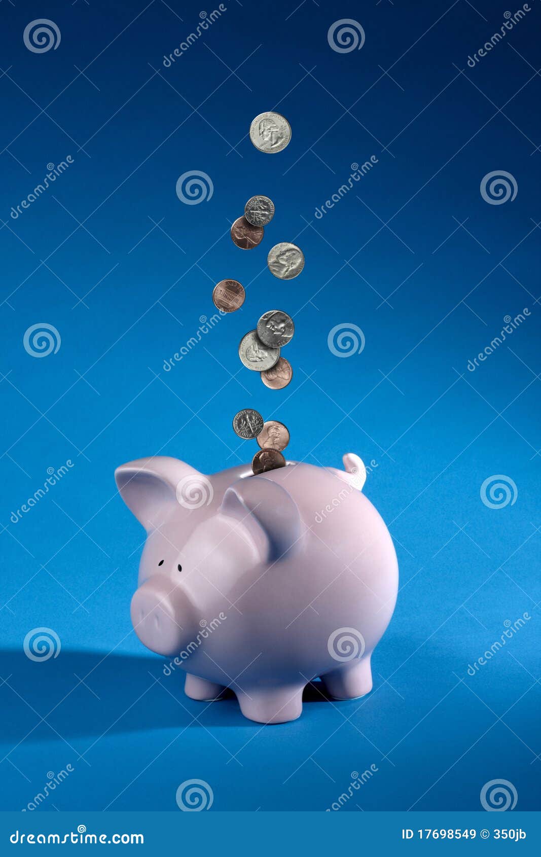 Coins Dropping into a Piggy Bank Stock Image - Image of money, shiny ...