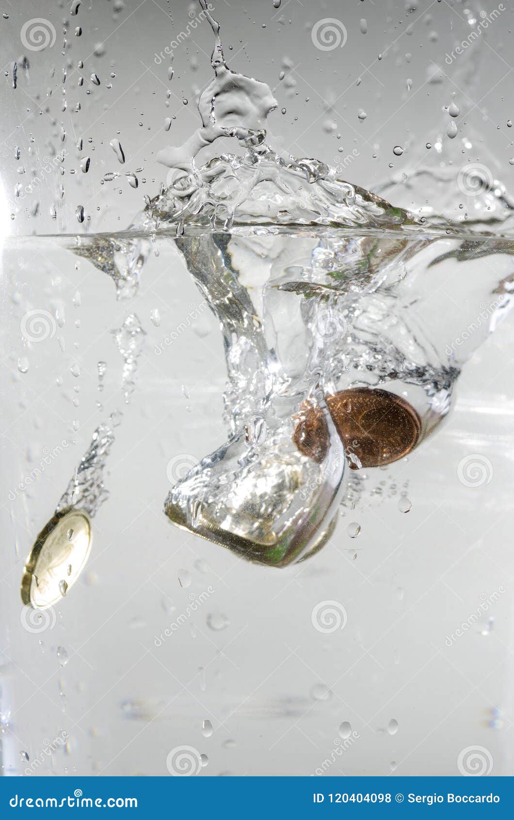 Coins Falling into the Water Stock Photo - Image of flash, splashes ...