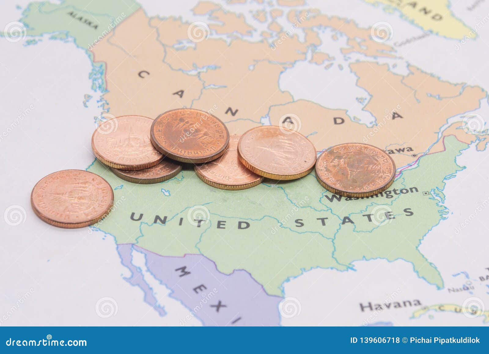 Coins on map American stock photo. Image of investment - 139606718