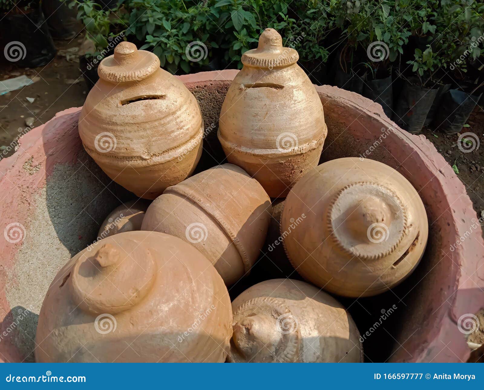 Coins and Notes Saver Pot of Mud Stock Image - Image of piggy, invest ...