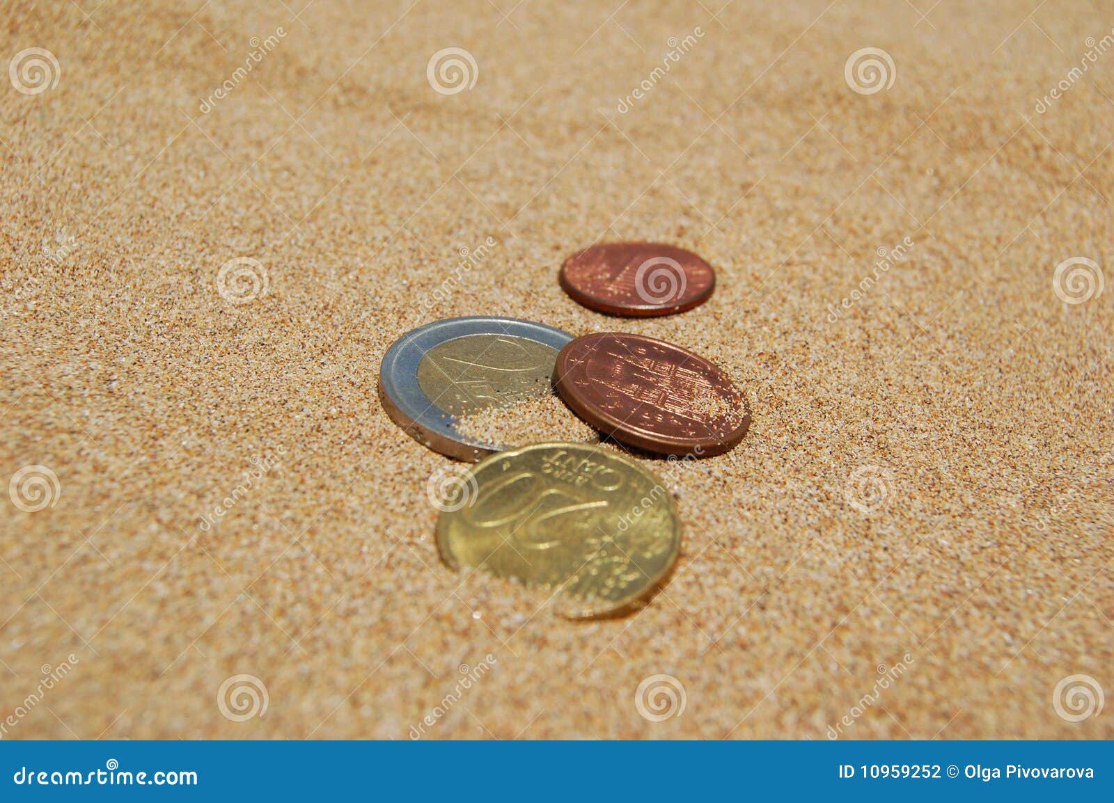 Coins in sand stock photo. Image of cents, metal, sink - 10959252