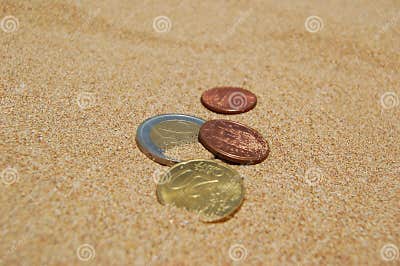 Coins in sand stock photo. Image of cents, metal, sink - 10959252