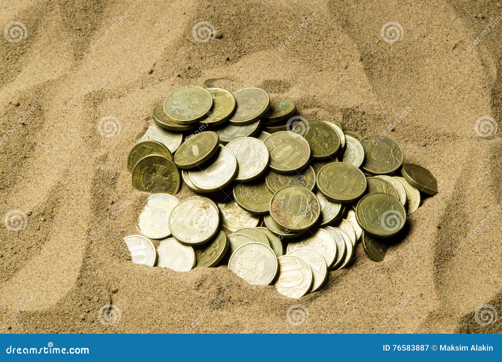 Coins in the sand stock image. Image of earnings, investment - 76583887