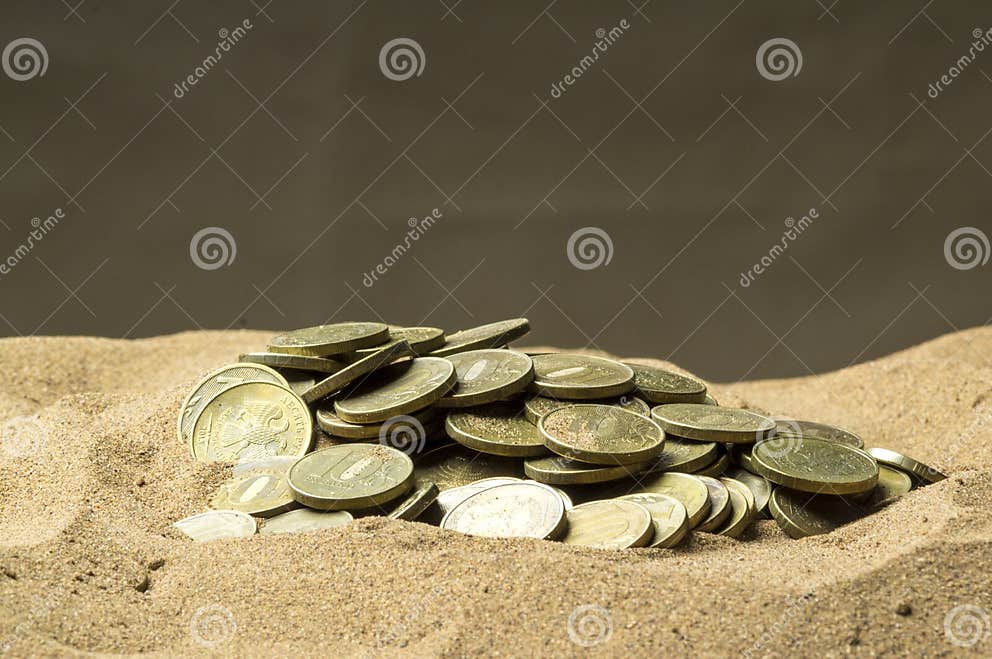 Coins in the sand stock image. Image of numismatic, dollar - 76583939