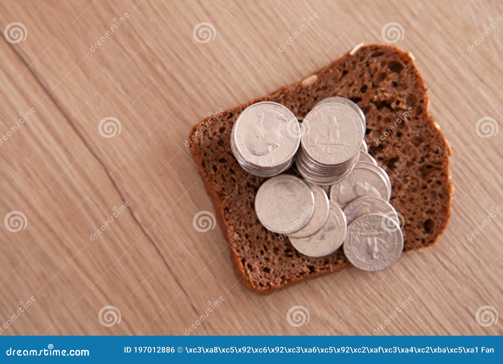 Coins Scattered on a Slice of Bread Stock Photo - Image of brown, items ...