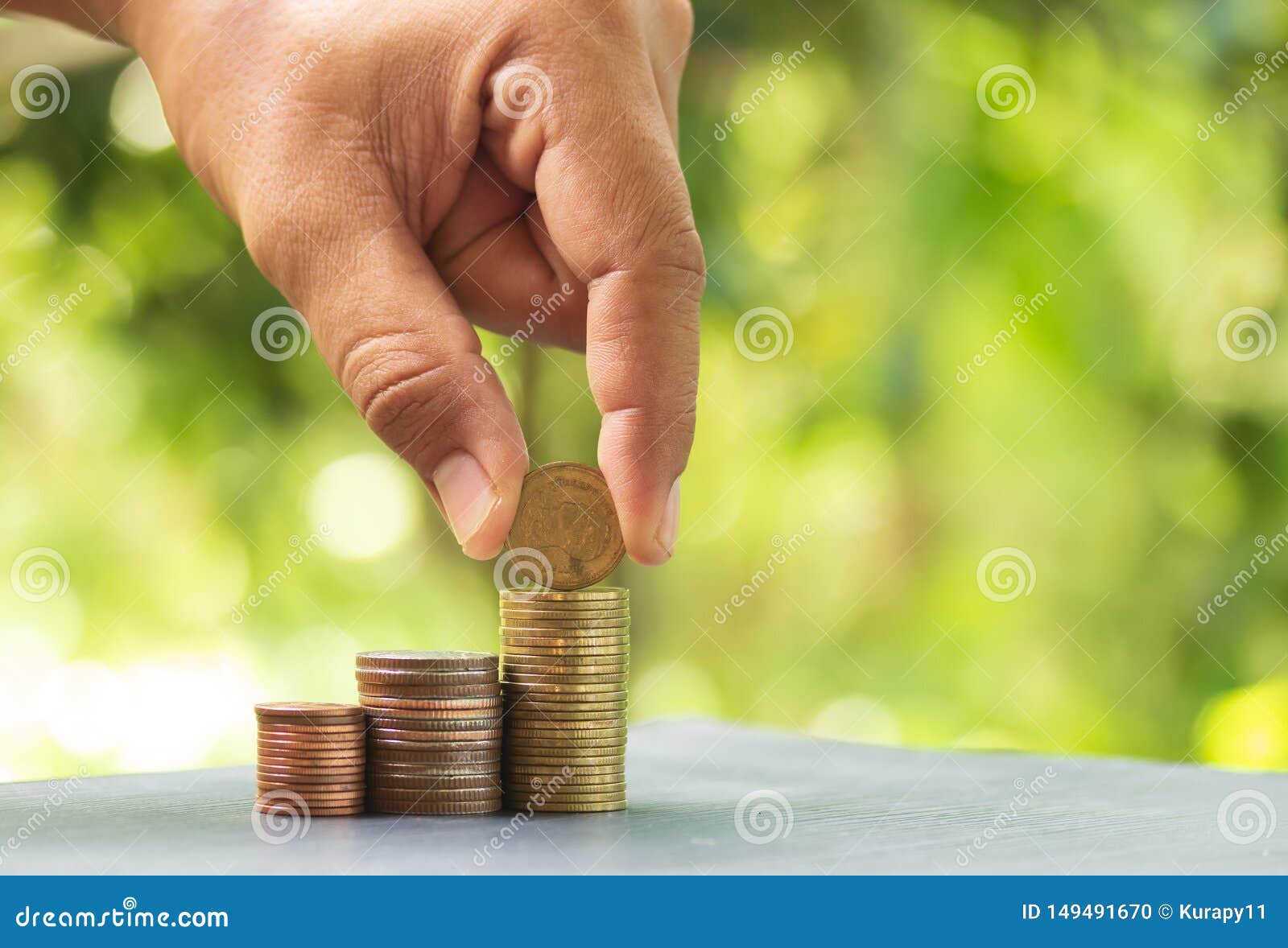 Coins Stack in Row on Wooden Background Stock Photo - Image of pile ...