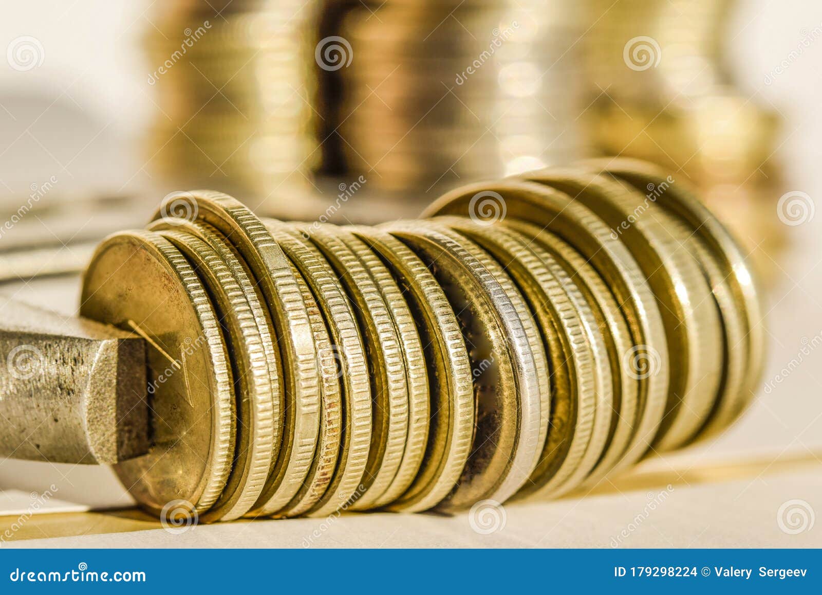 Coins stacked in columns. stock photo. Image of column - 179298224