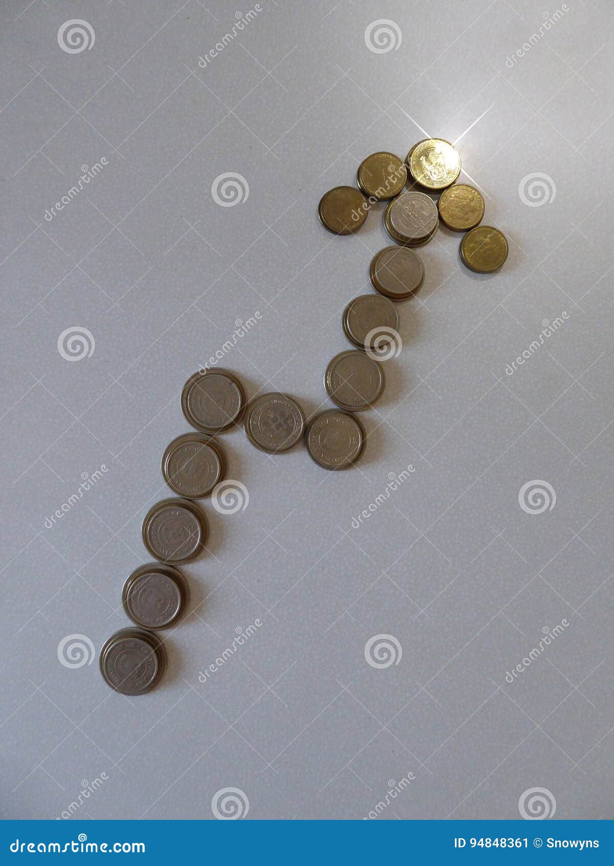Coins Stacked in Shape of Arrow Stock Image - Image of banking, bucks ...