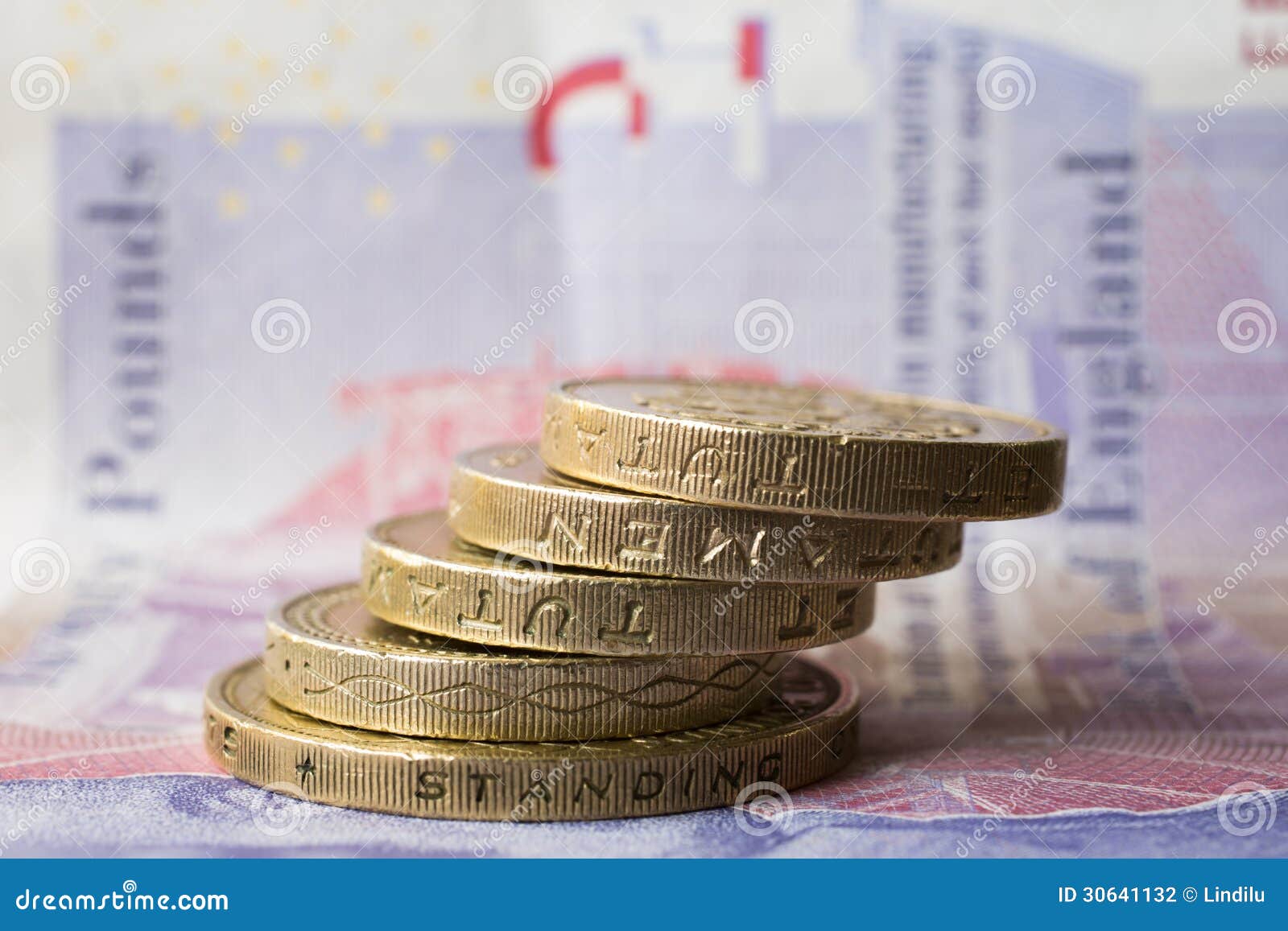 Coins Stacked on Twenty Pound Note Stock Photo - Image of pound, money ...