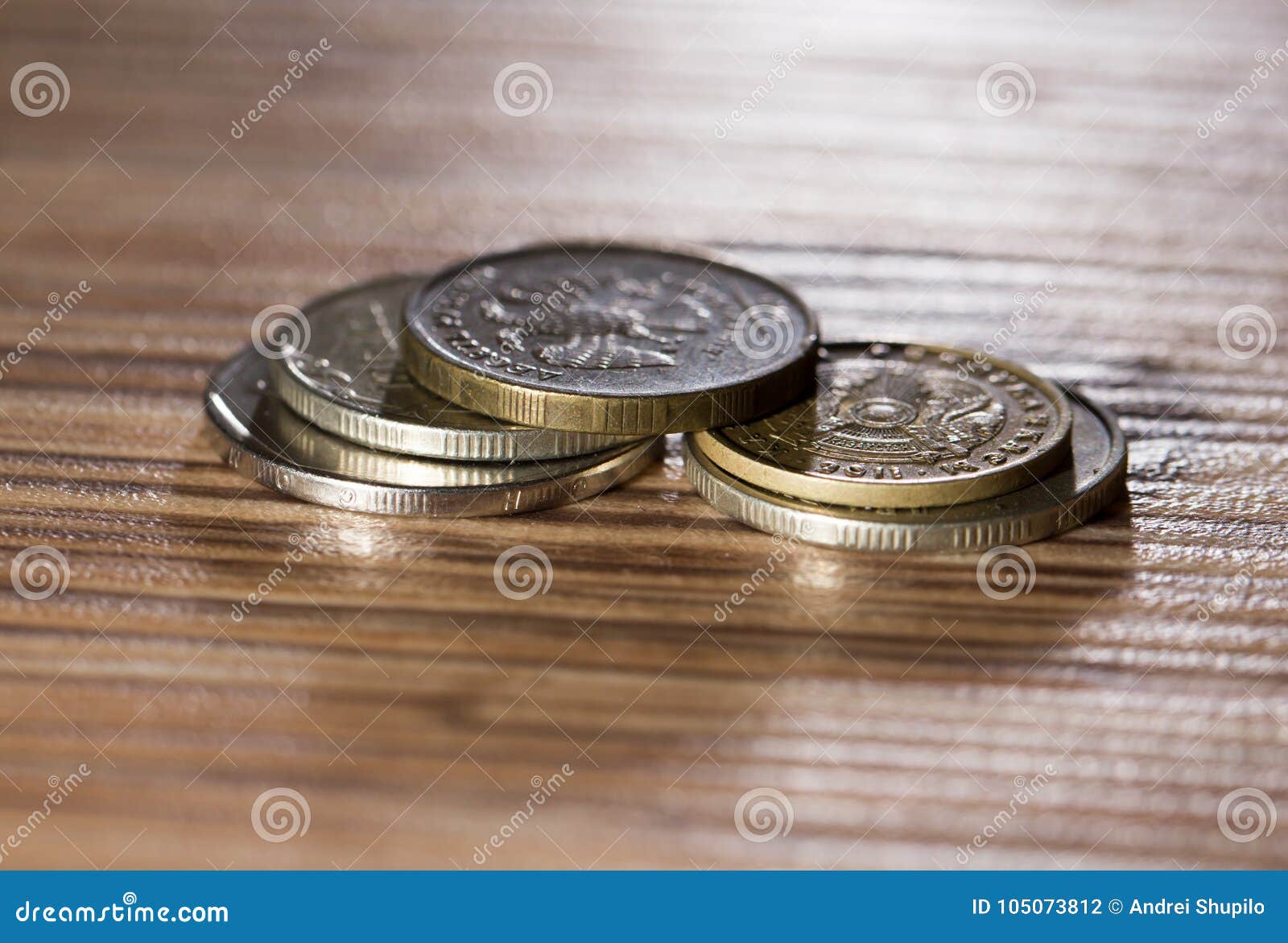 Coins on the table. macro stock photo. Image of gold - 105073812