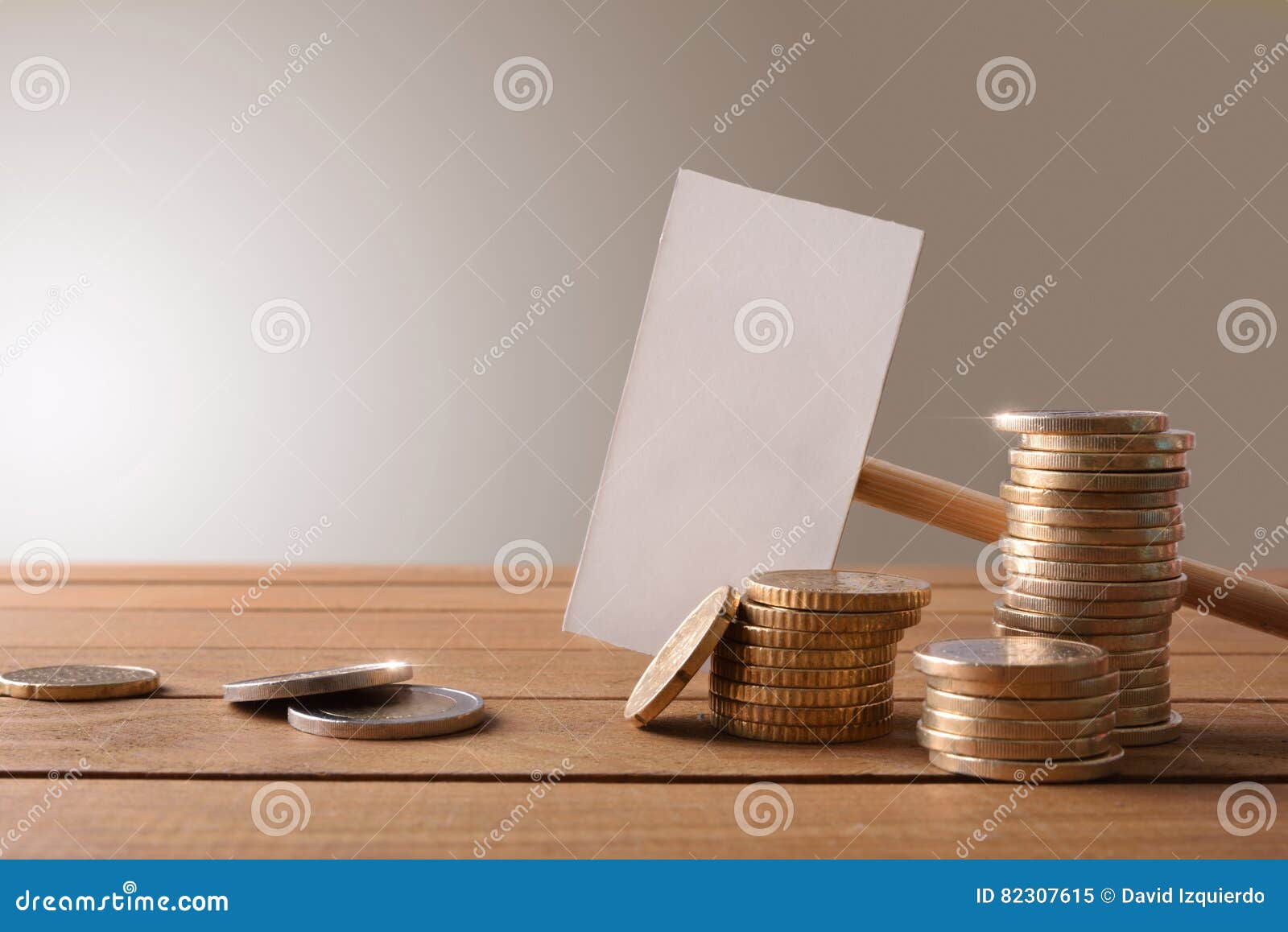 Coins on Wooden Table with Banner and Brown Background Stock Image ...