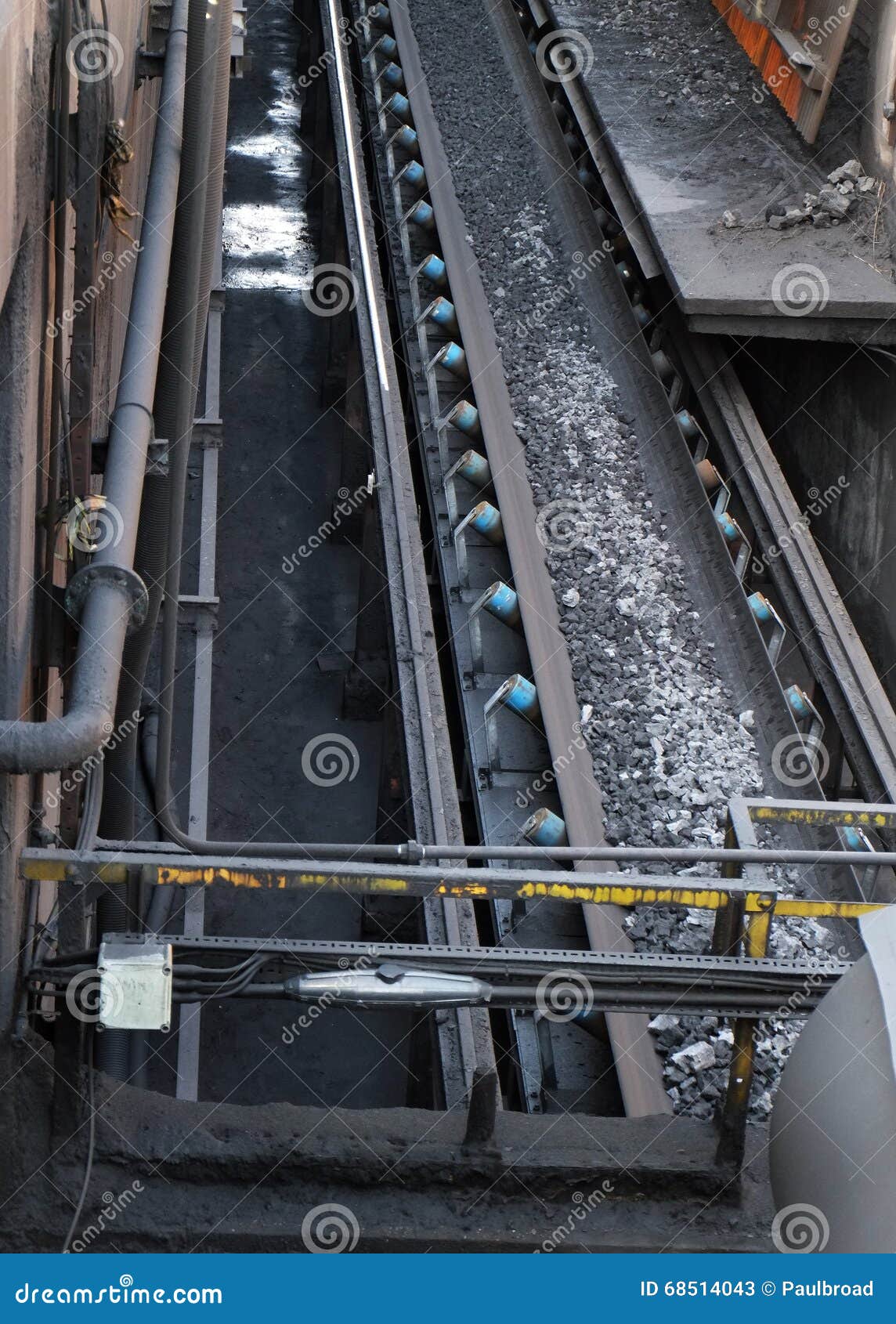 Coke on conveyor belt. stock image. Image of rubber, carbon - 68514043