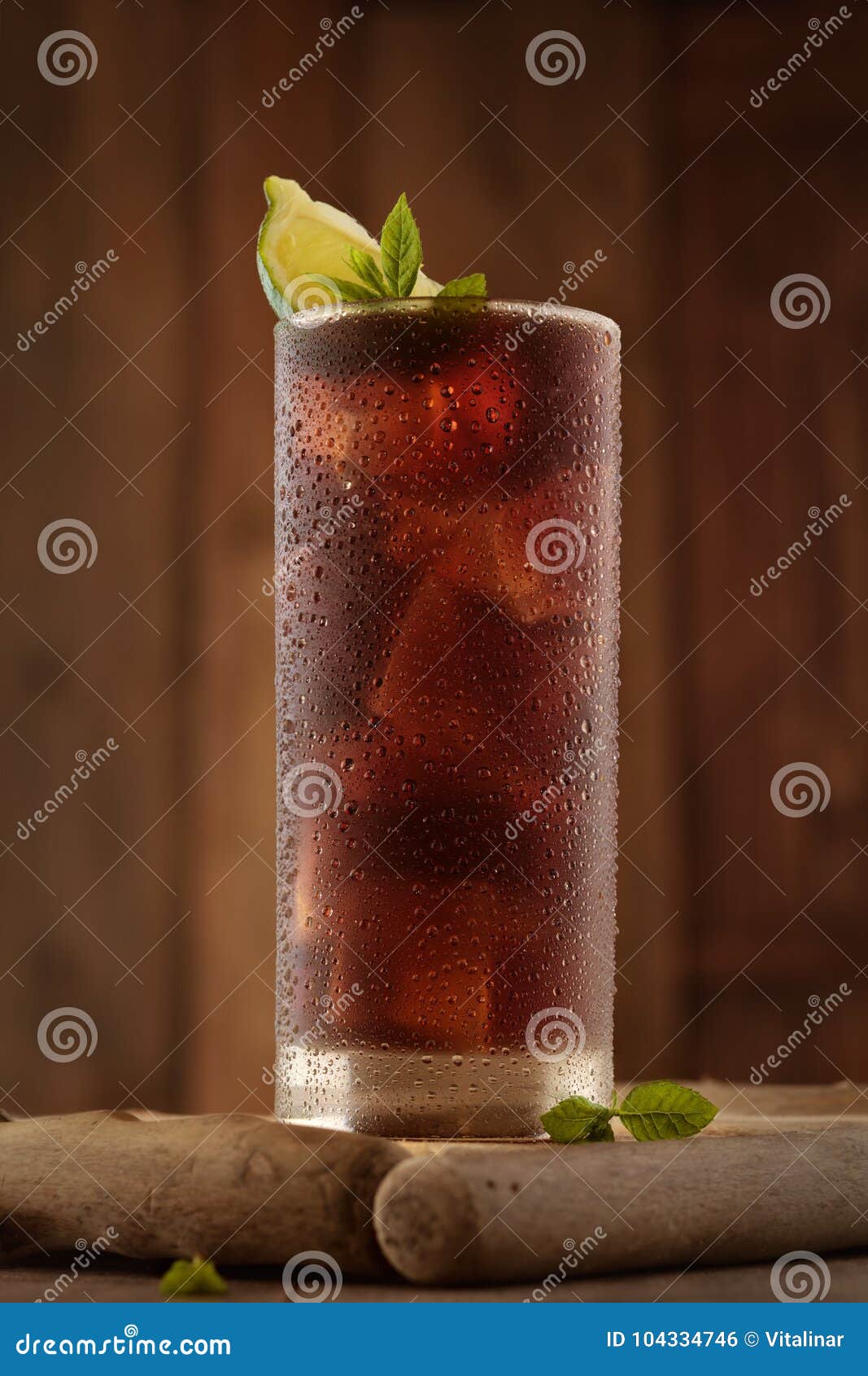 Glass of cola with ice. stock photo. Image of liquid - 104334746