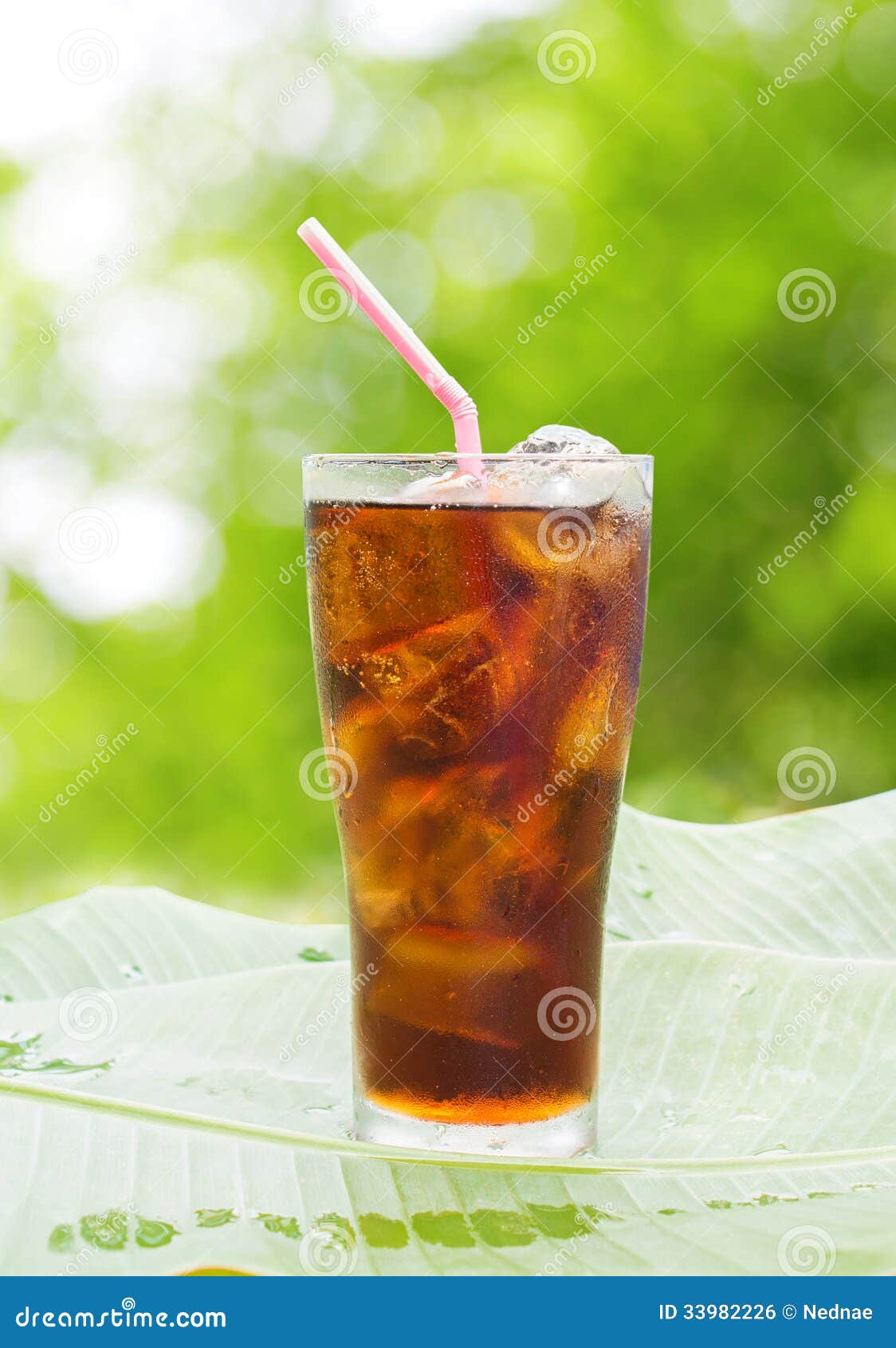 Cola glass with ice stock photo. Image of full, banana - 33982226