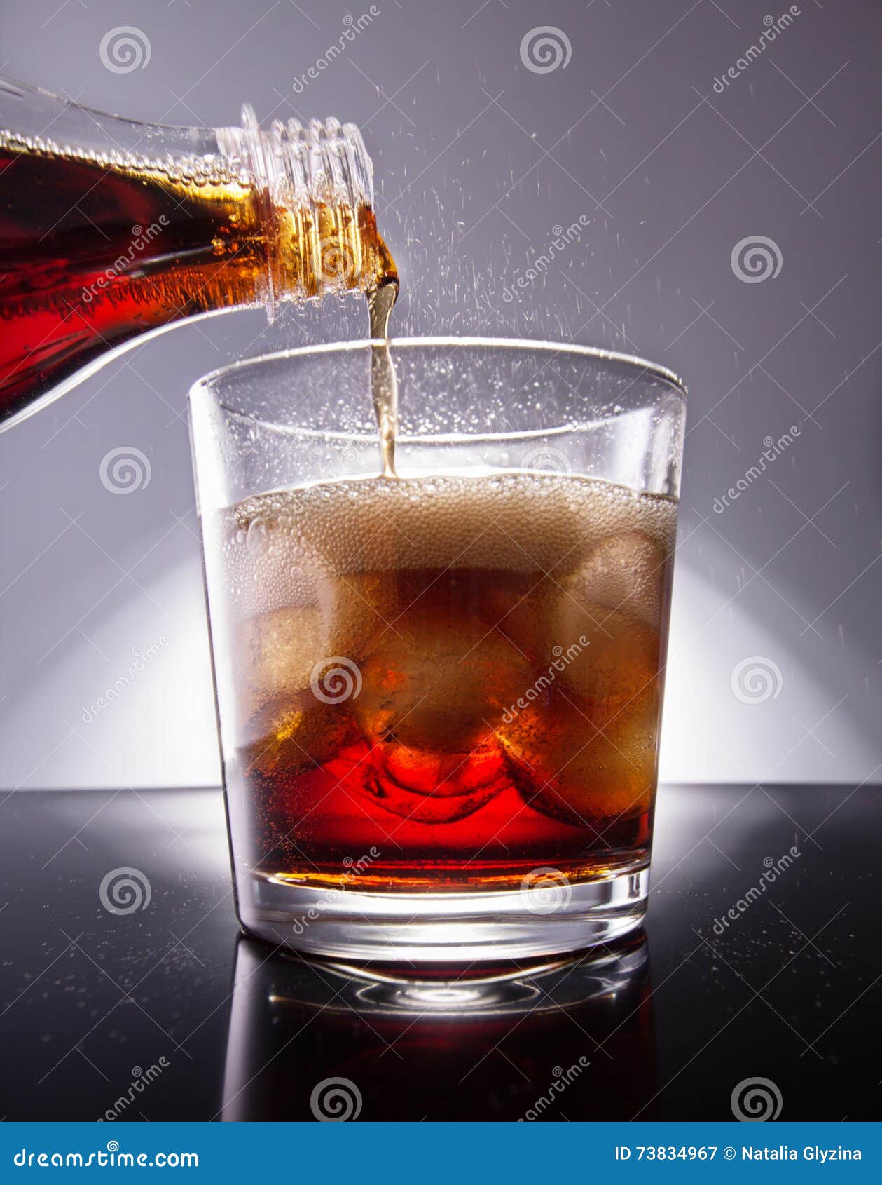 Cola with ice cubes stock image. Image of life, splashes - 73834967