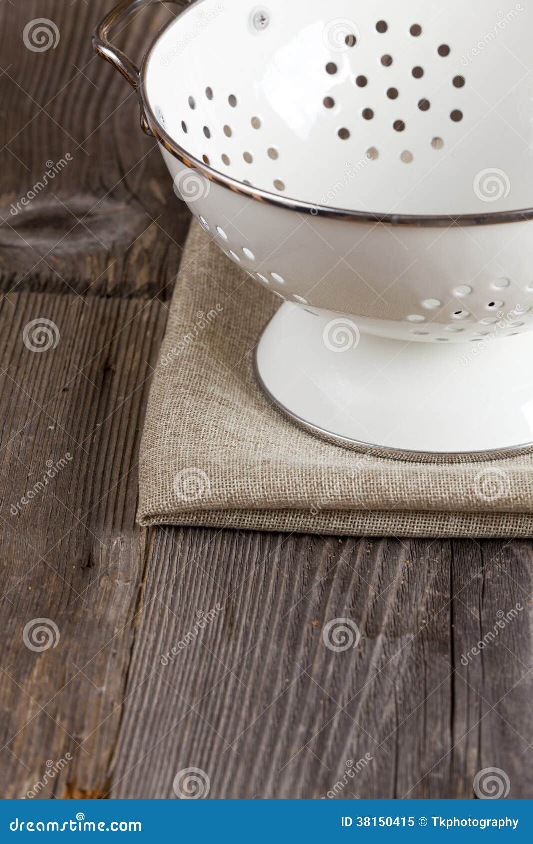 Colander Stands on a Rustic Kitchen Table Stock Image - Image of light ...
