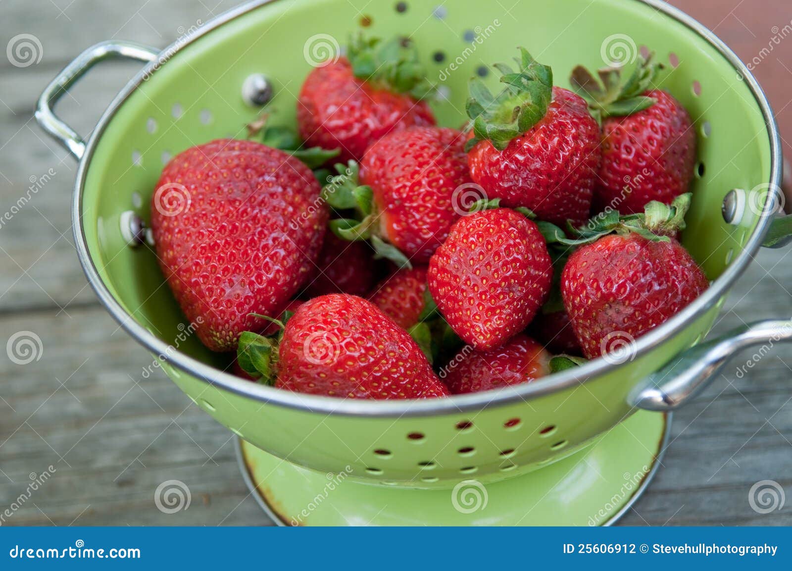 Colander of Strawberries stock photo. Image of juicy - 25606912
