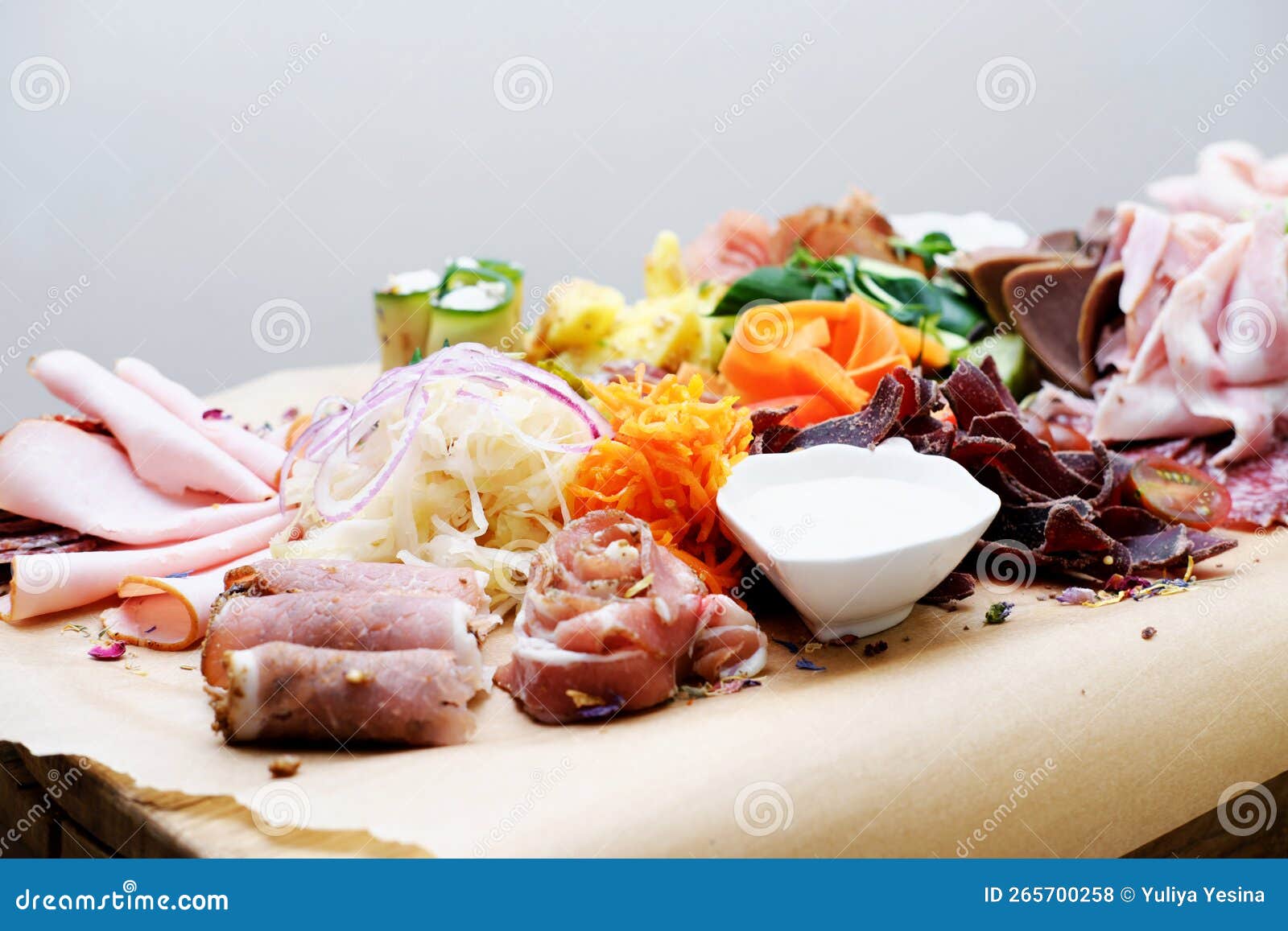 Cold Appetizer of Fresh Vegetables and Meat on the Buffet Table Stock ...