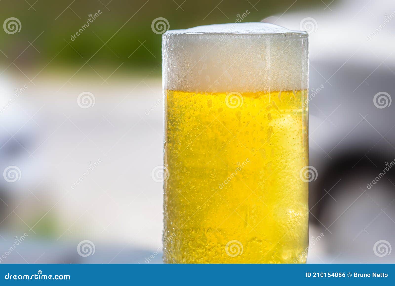 Cold Beer Mug with Foam Isolated on a Table Stock Photo - Image of ...