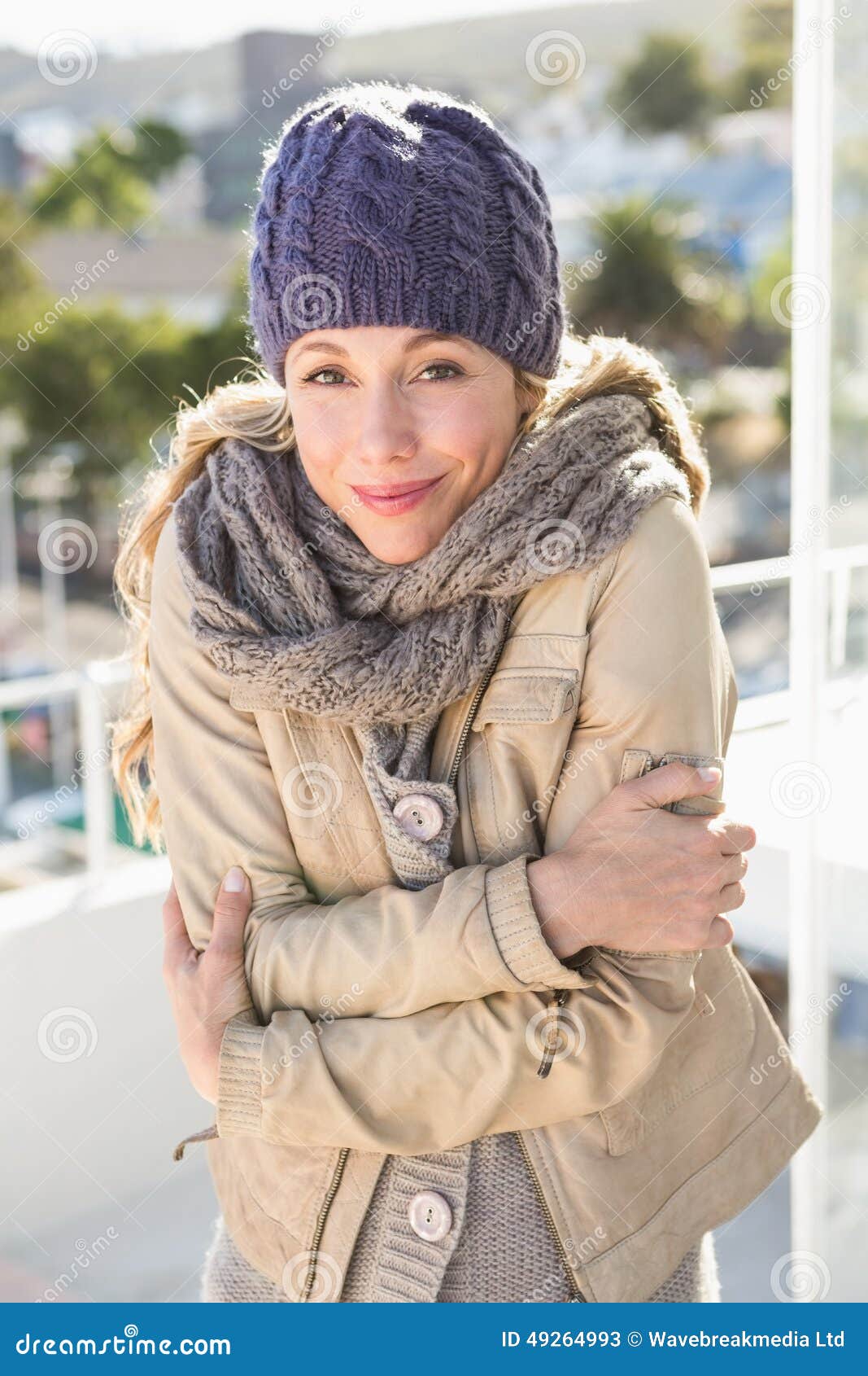 Cold Blonde in Warm Clothes Looking at Camera Stock Image - Image of ...