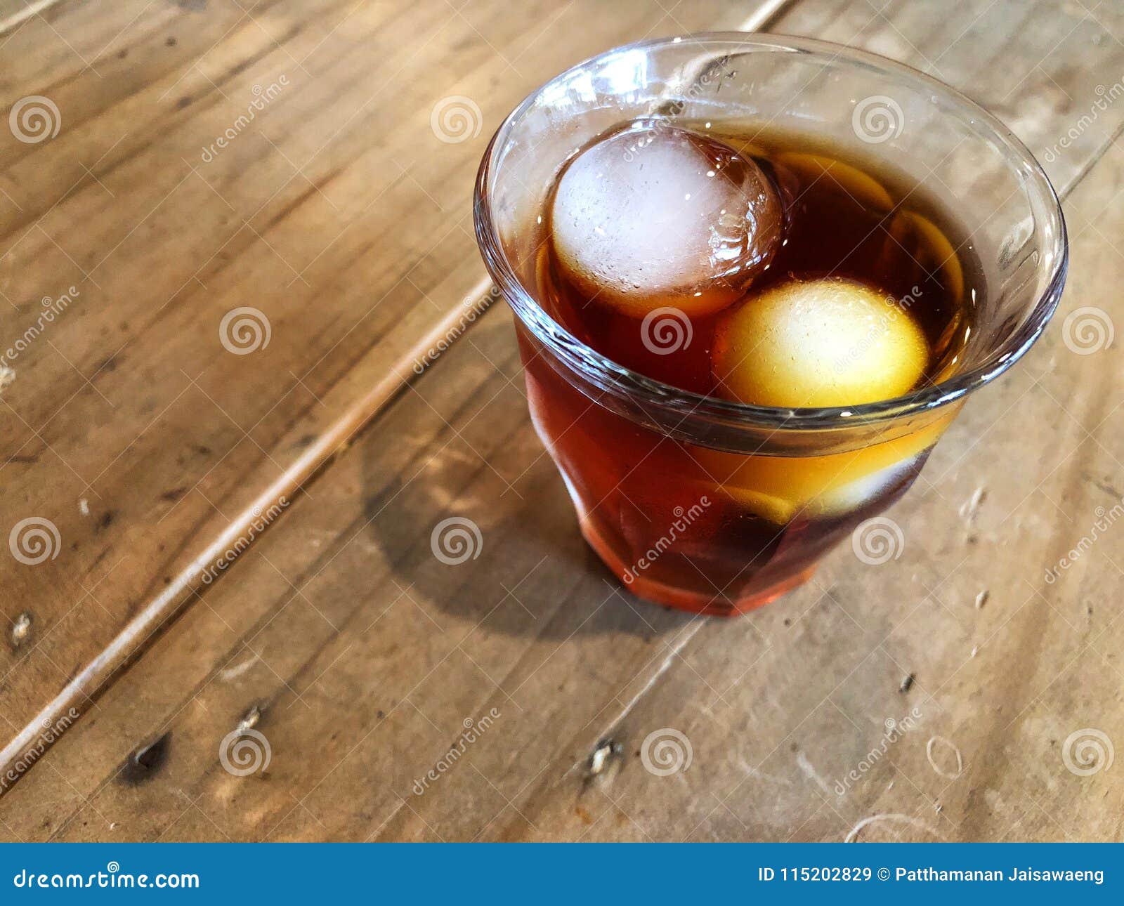 Cold Brew Coffee and Ice in Glass on the Wooden Table with Natural ...