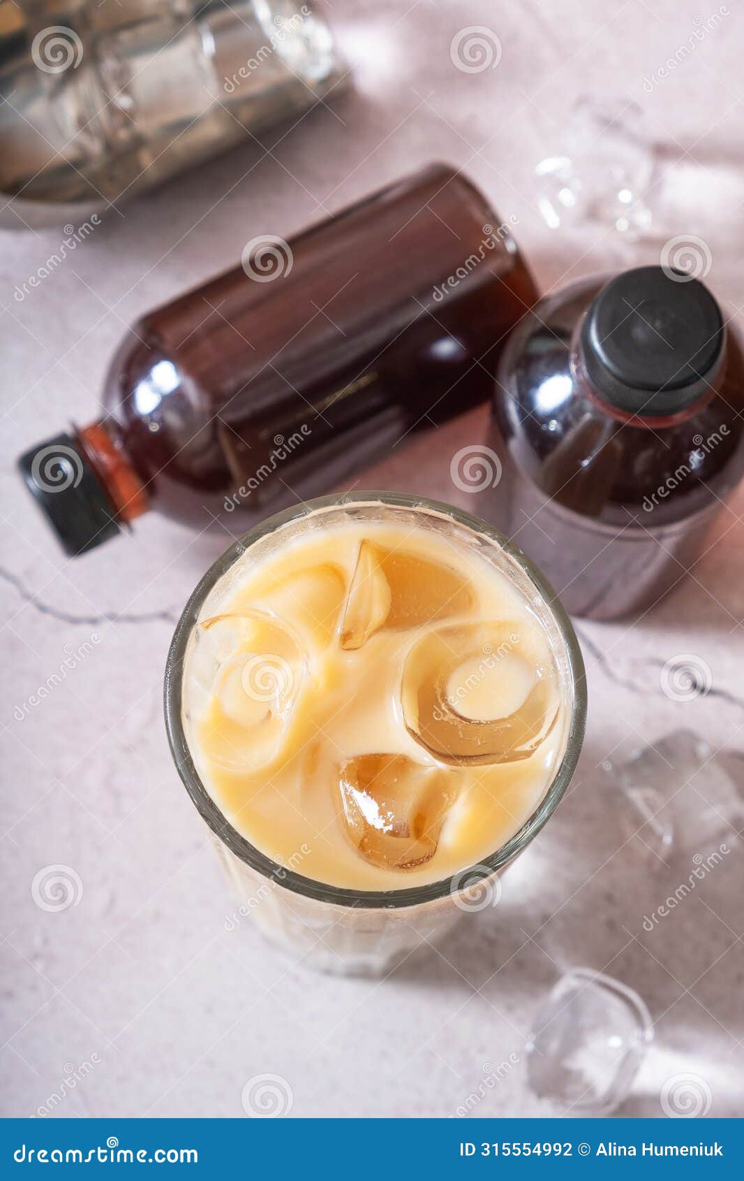 Cold Brew Coffee with Milk and Cold Brew Coffee in Bottles with Ice ...