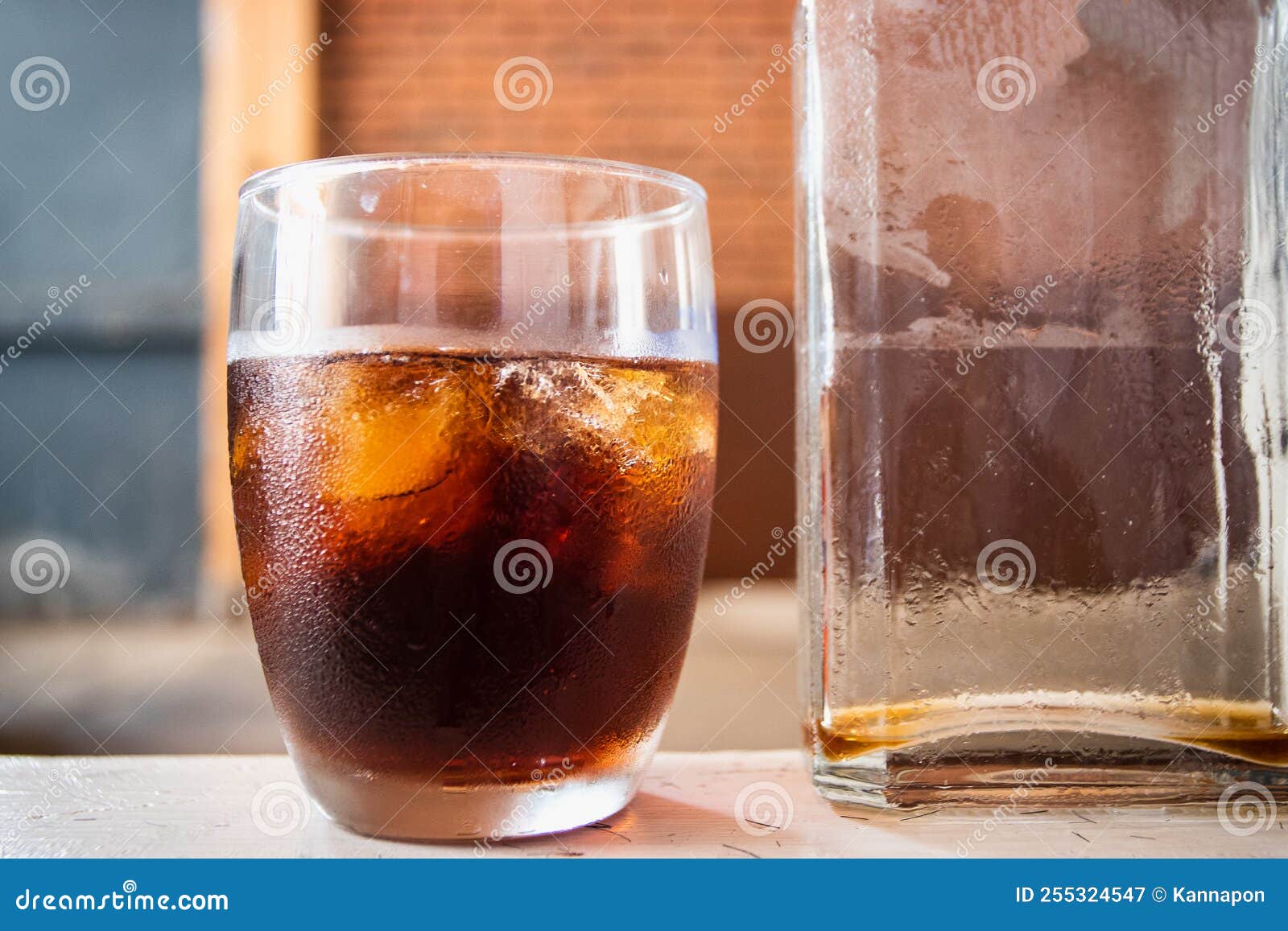 Cold-brewed Coffee in a Clear Glass with a Clear Bottom Stock Image ...