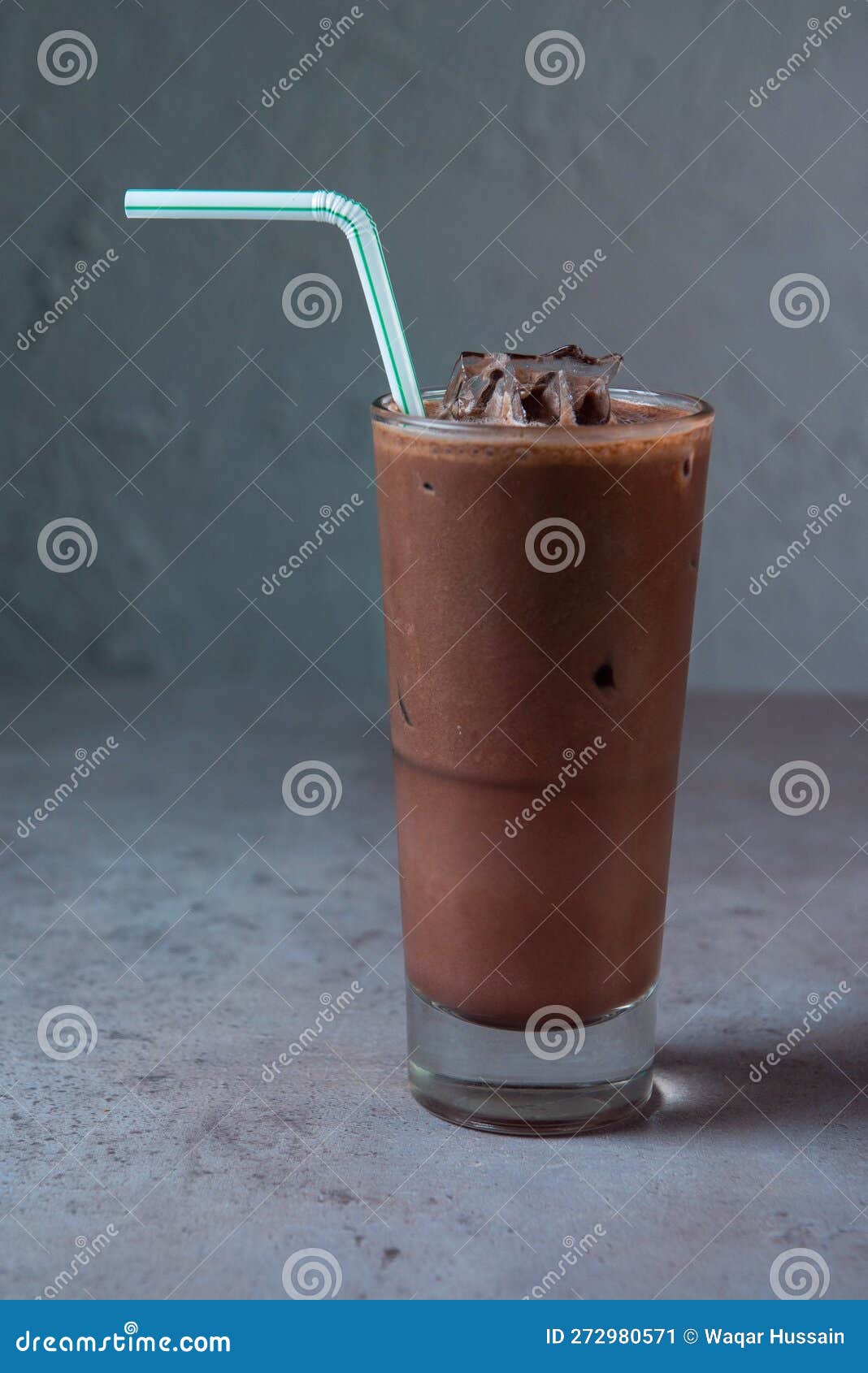 Cold Chocolata Serving in Glass with Straw Side View on Background ...