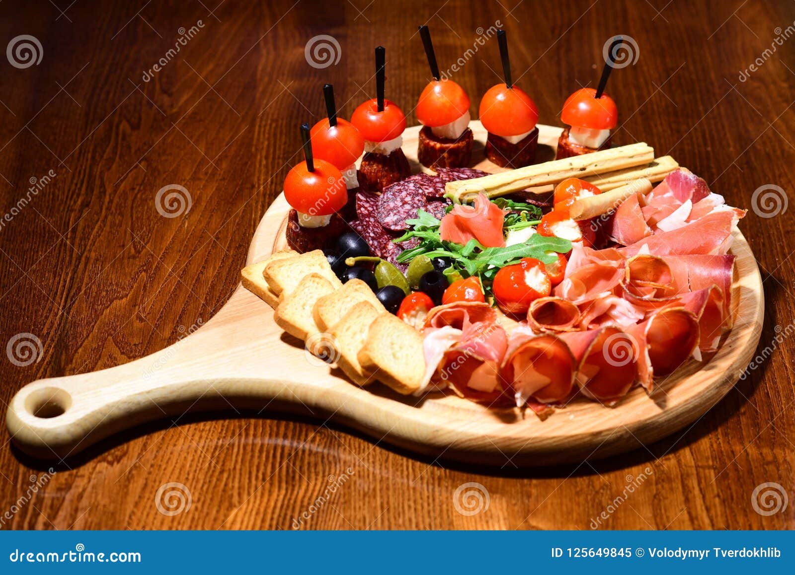 Cold Cut Platter. Wooden Platter with Cold Meat Cuts and Canape Stock ... Cold Cut Platter. Wooden Platter with Cold Meat Cuts and Canape Stock ...