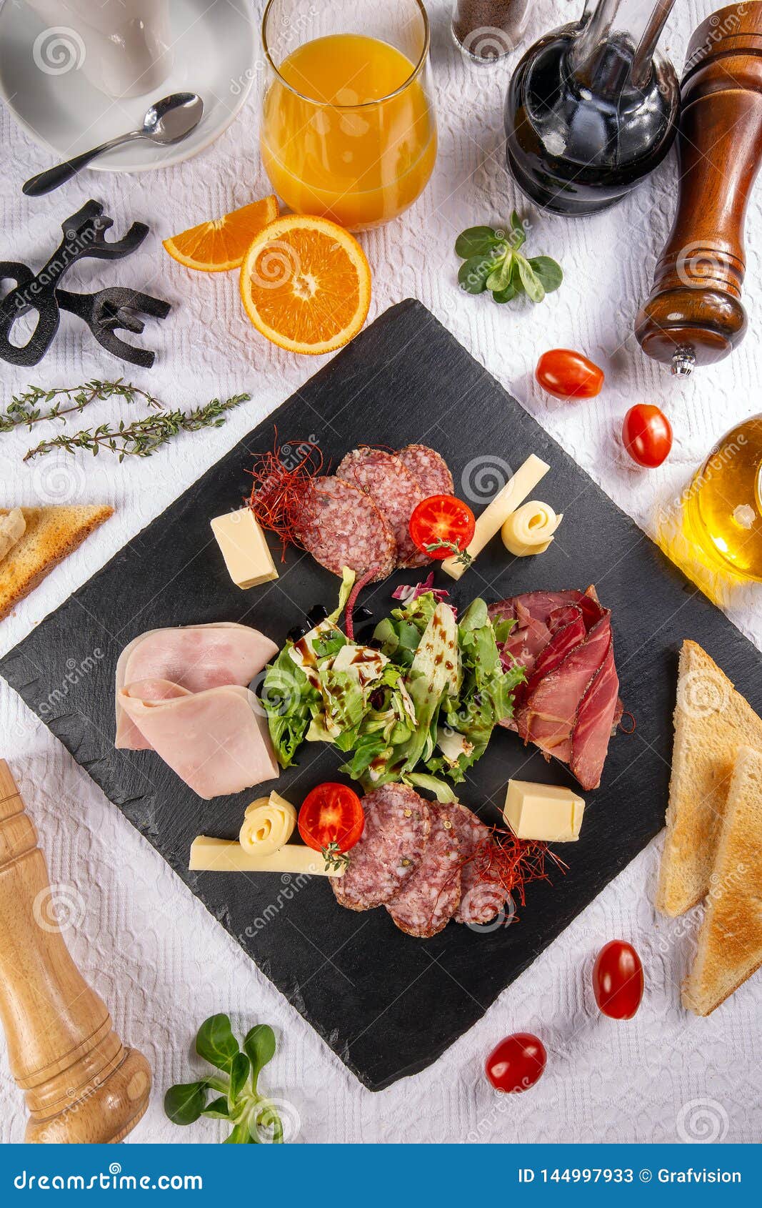 Cold cuts and cheese board stock image. Image of cold - 144997933
