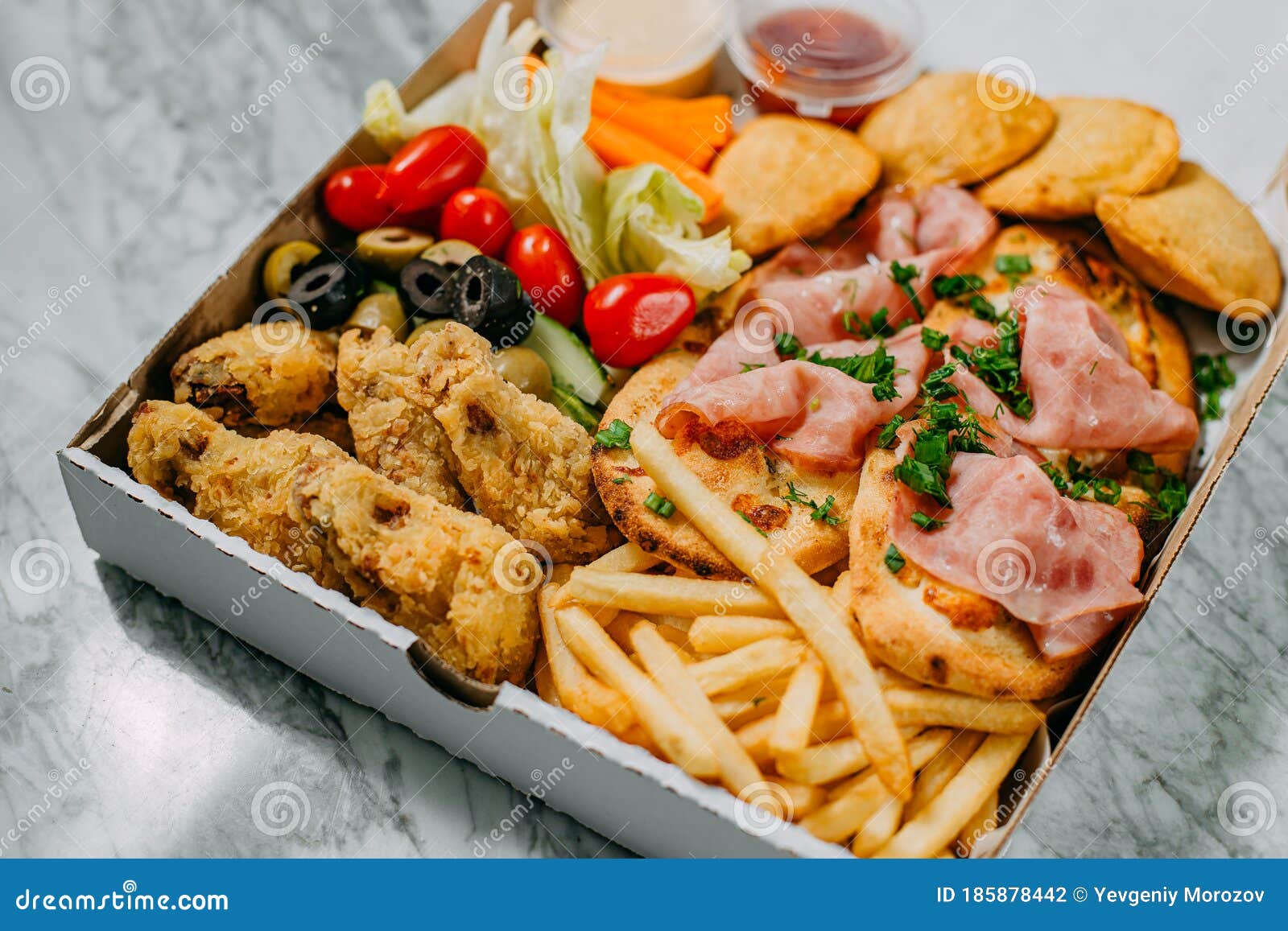 Cold Cuts with Vegetables on a Marble Table Stock Photo - Image of ...